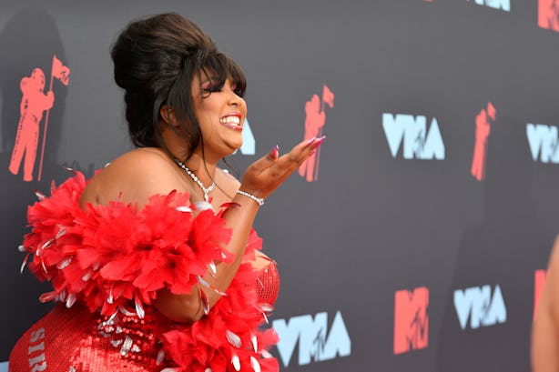 Lizzo Has Purple Hair Now & She Literally Looks Like A Mermaid