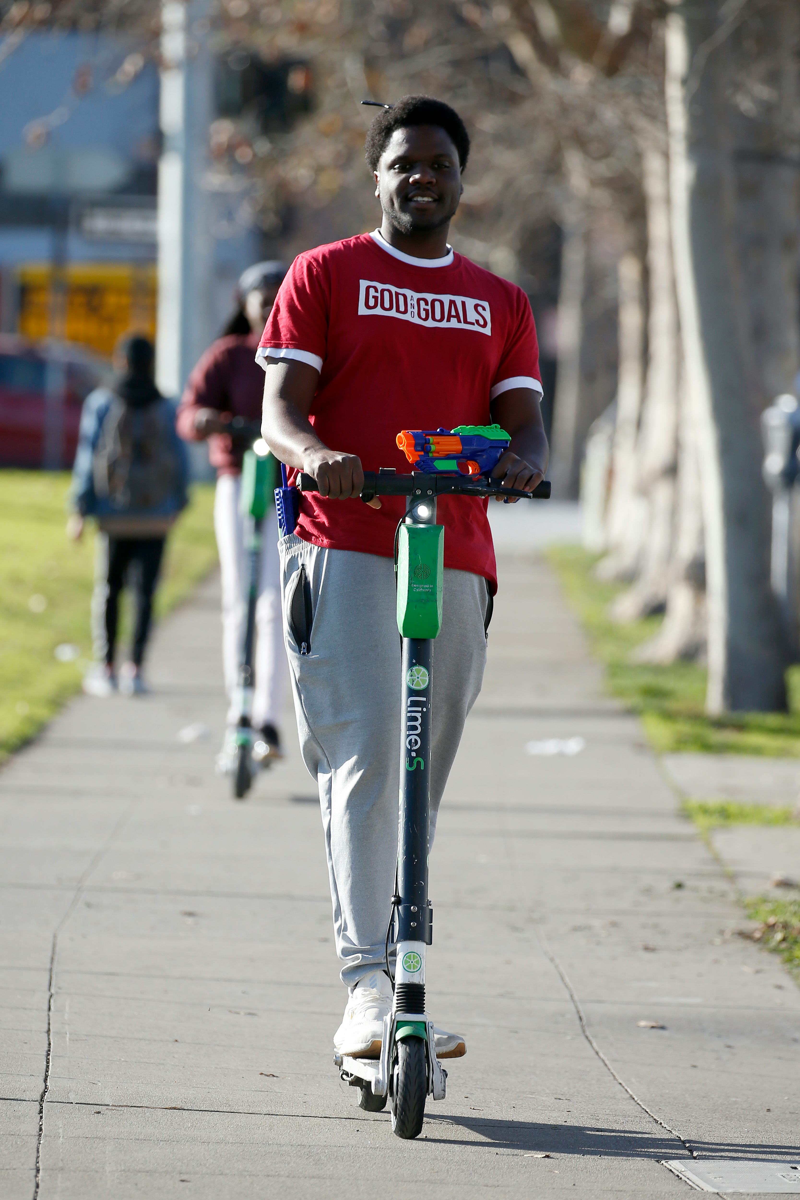 Lime will now know if you're riding its scooters on the sidewalk