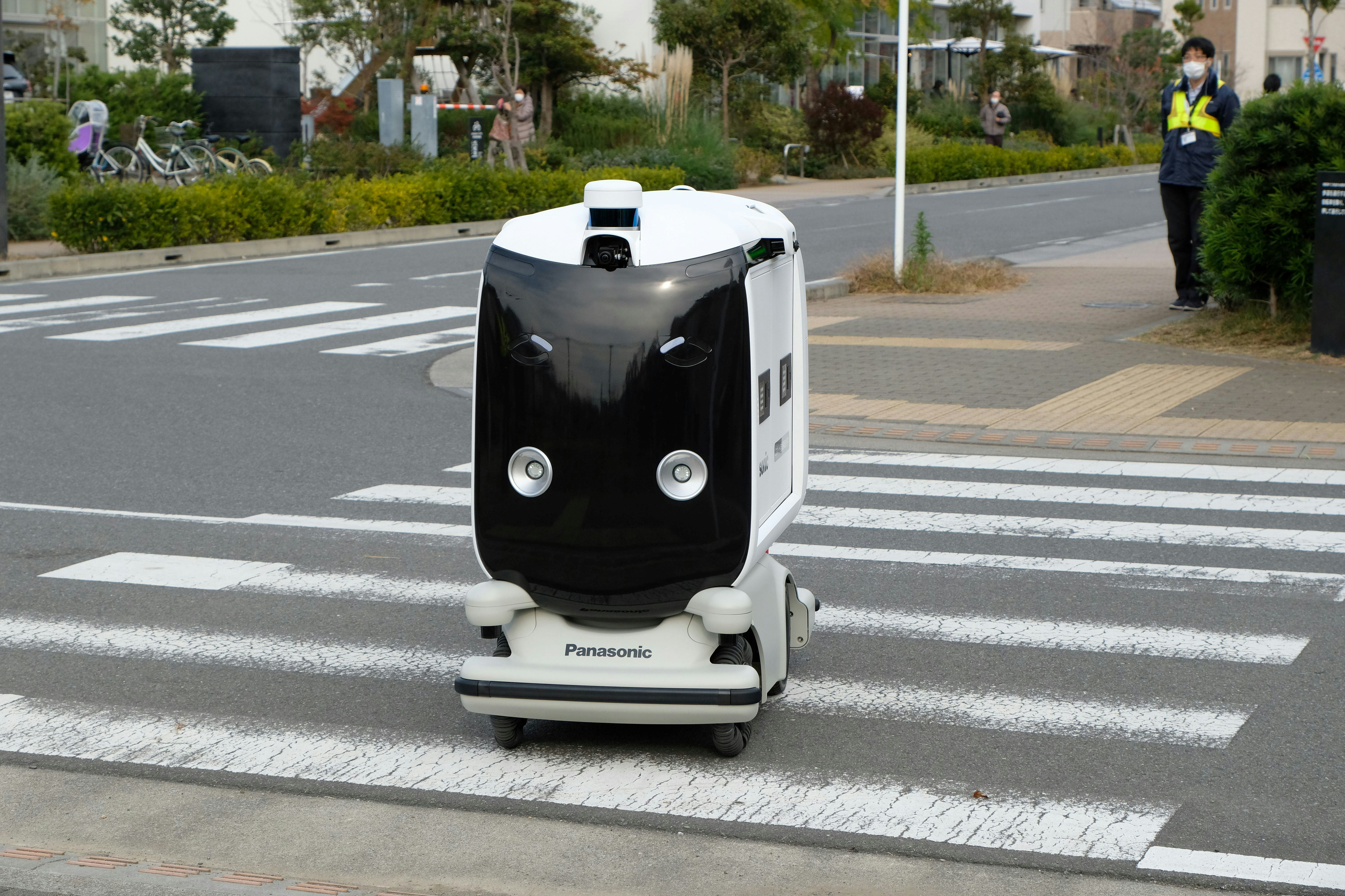 Panasonic's cute delivery bot to start ferrying packages in Japan