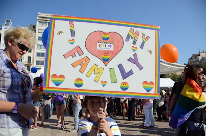 Beautiful Photos Of Parents & Kids Celebrating Pride Over The Years
