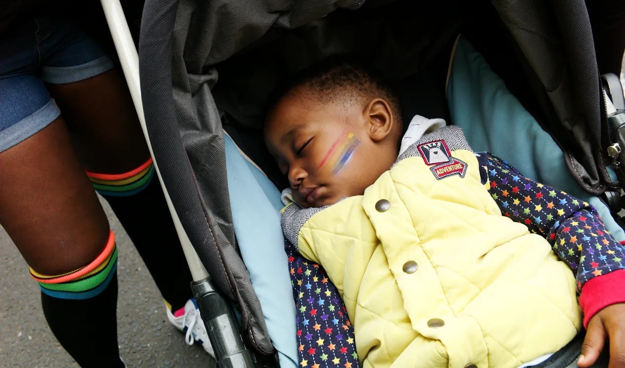 Beautiful Photos Of Parents & Kids Celebrating Pride Over The Years