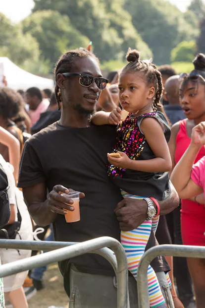 Beautiful Photos Of Parents & Kids Celebrating Pride Over The Years