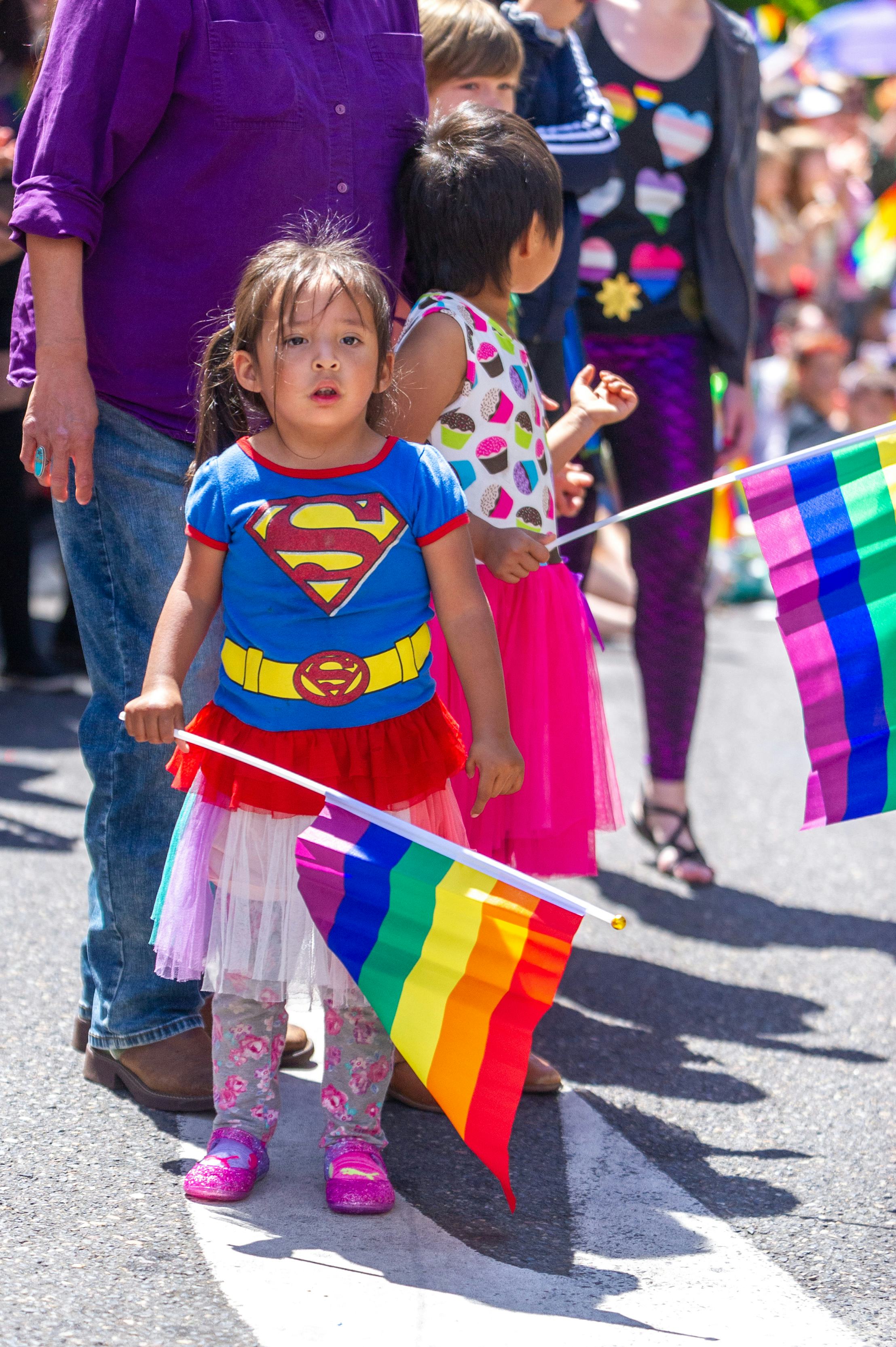 Beautiful Photos Of Parents & Kids Celebrating Pride Over The Years