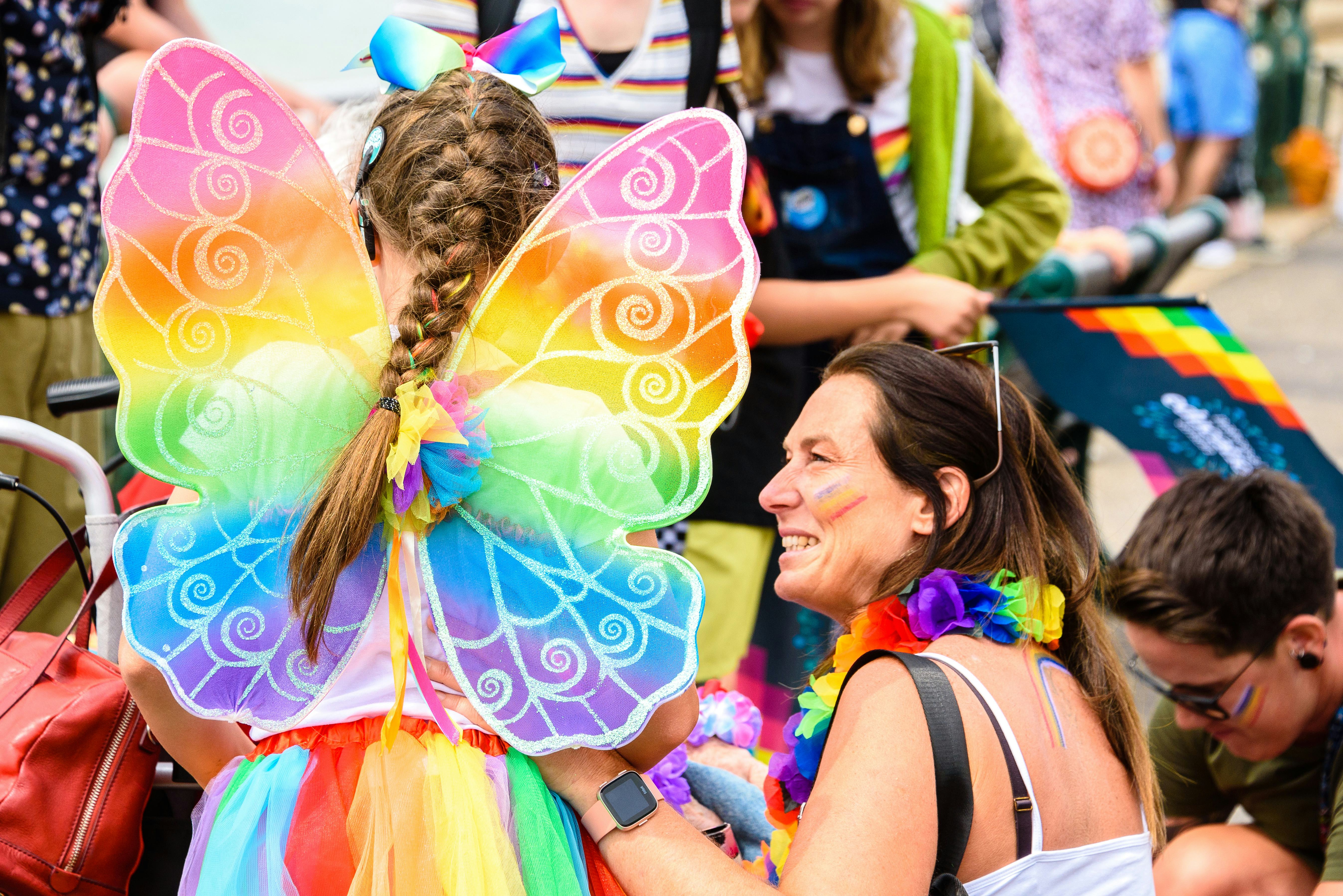 Beautiful Photos Of Parents & Kids Celebrating Pride Over The Years