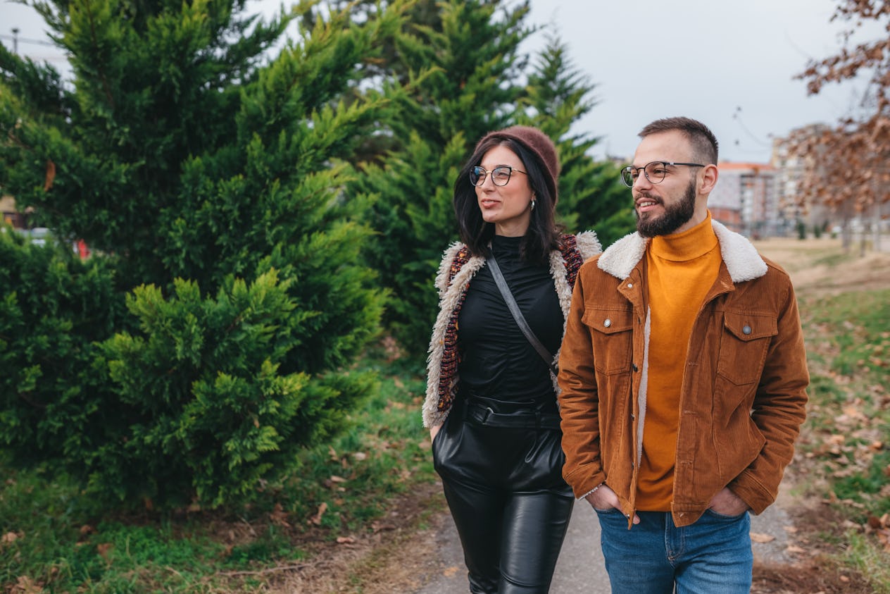 9 Differences Between Being Friendly Vs. Flirty, According To Experts