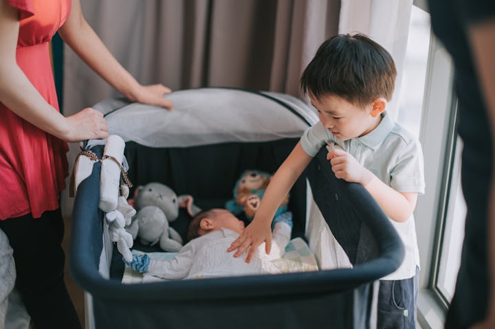 Toddler Not Interested In New Baby? How To Get Them Excited & Involved