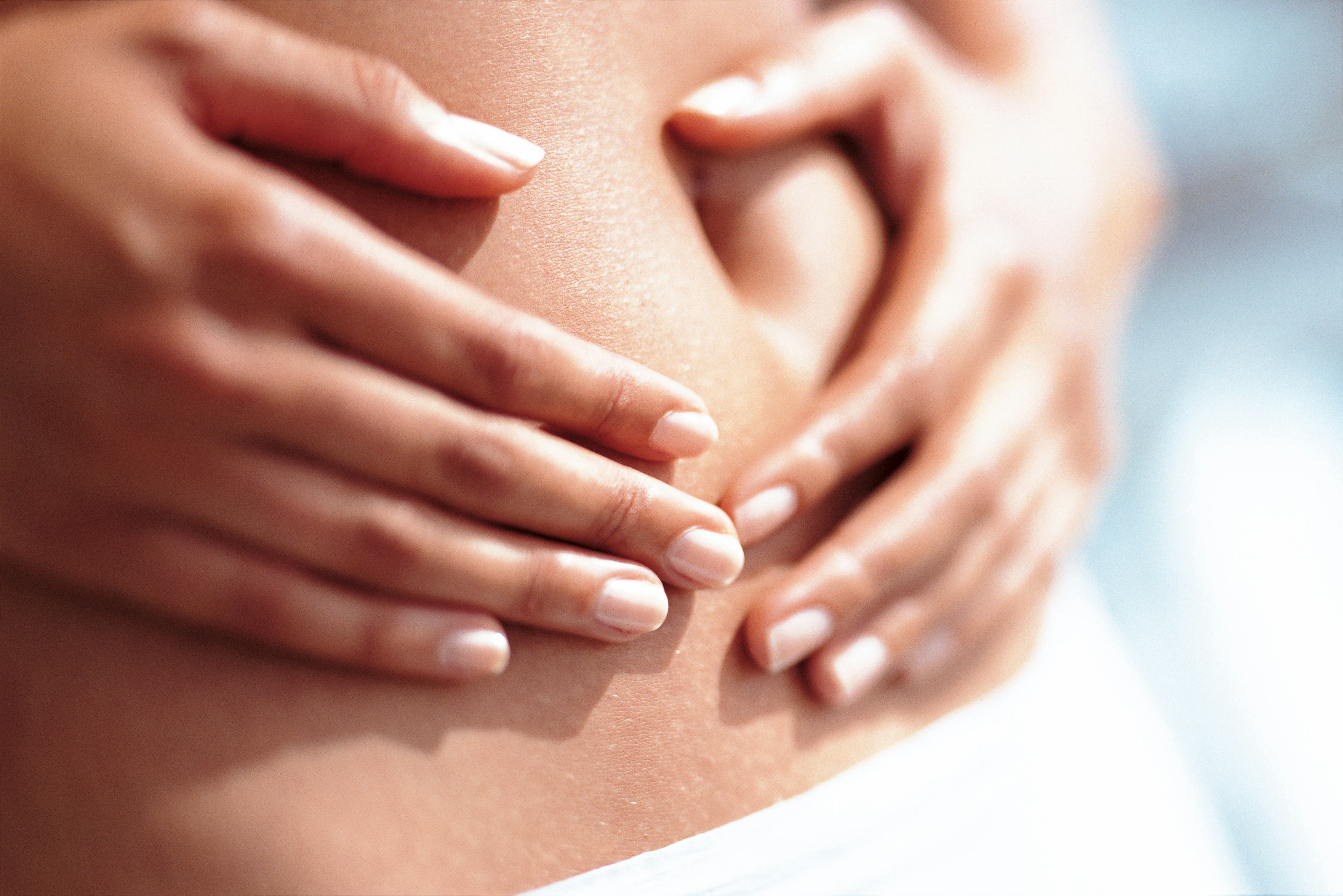 Can You Have A Miscarriage Without Bleeding? OB-GYNs Explain