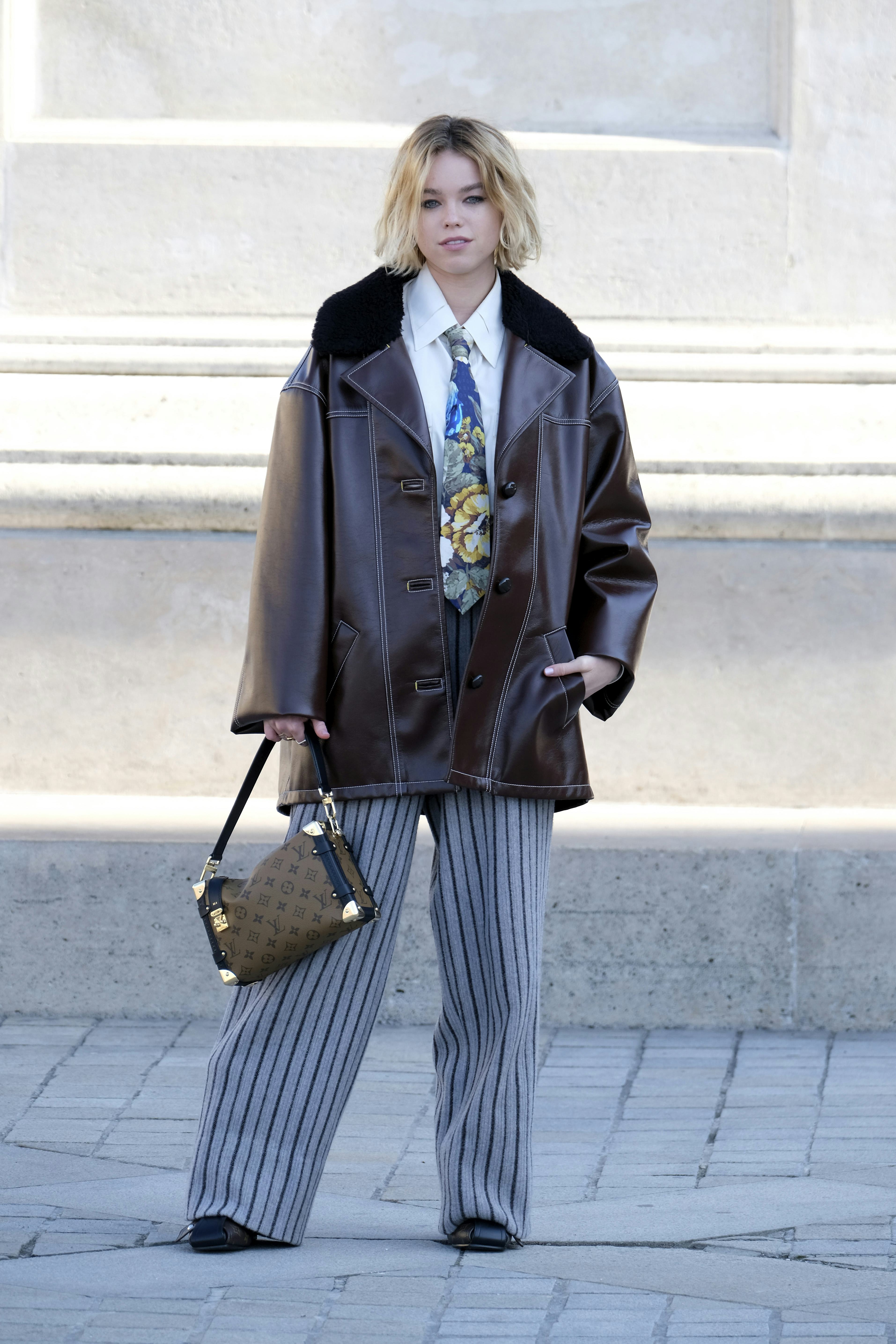 Milly Alcock Masters the ‘Cool Dad’ Look at the Louis Vuitton Show