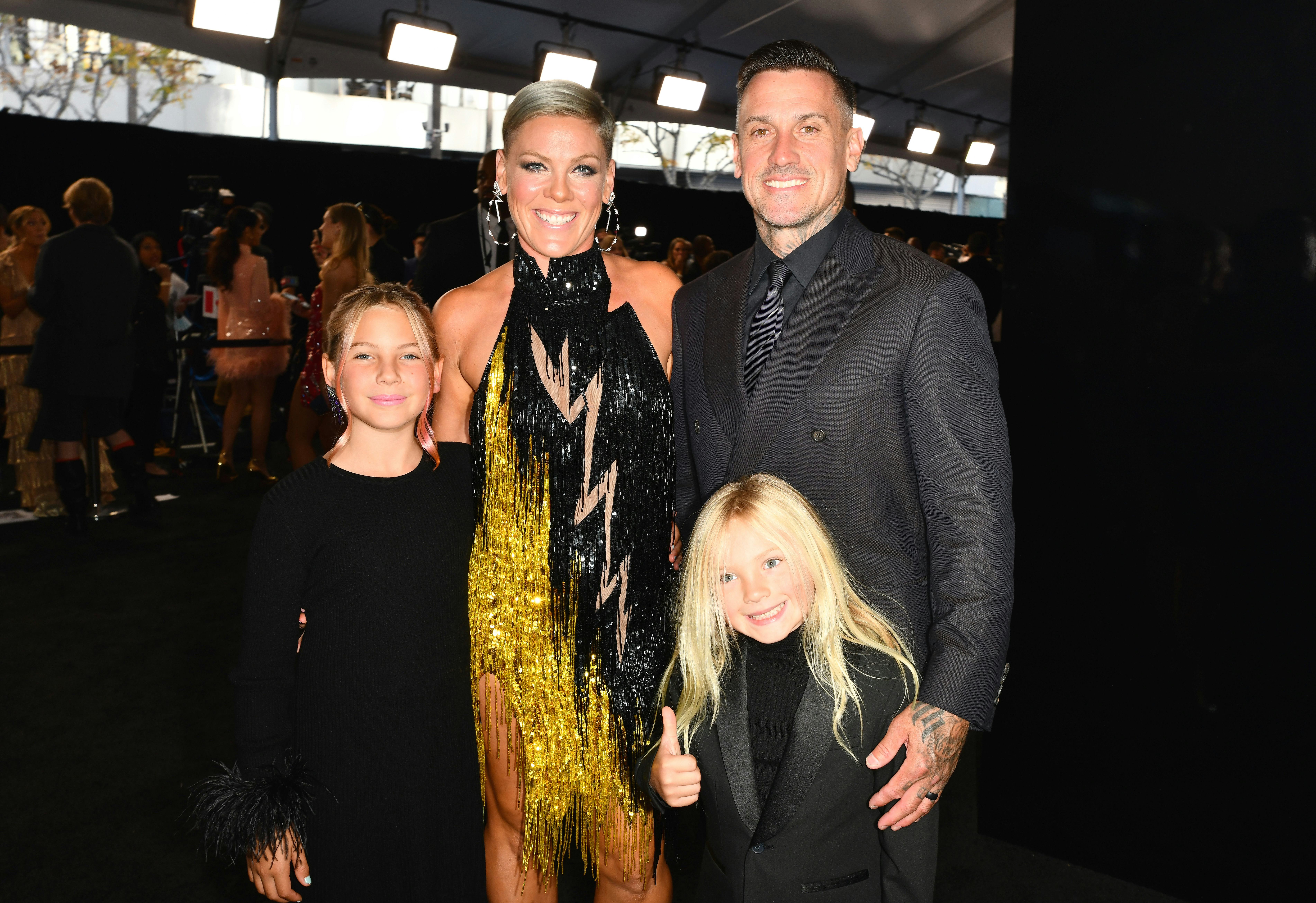 Pink's Kids & Husband Carey Hart Attend The AMAs To Cheer Her On