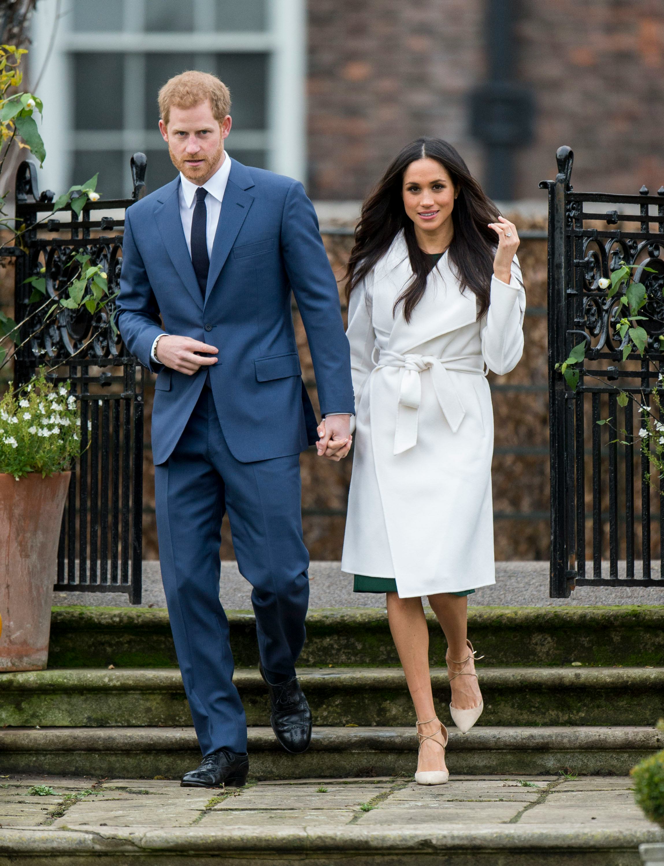 Harry & Meghan React To The Racist "Straight Outta Compton" Headline