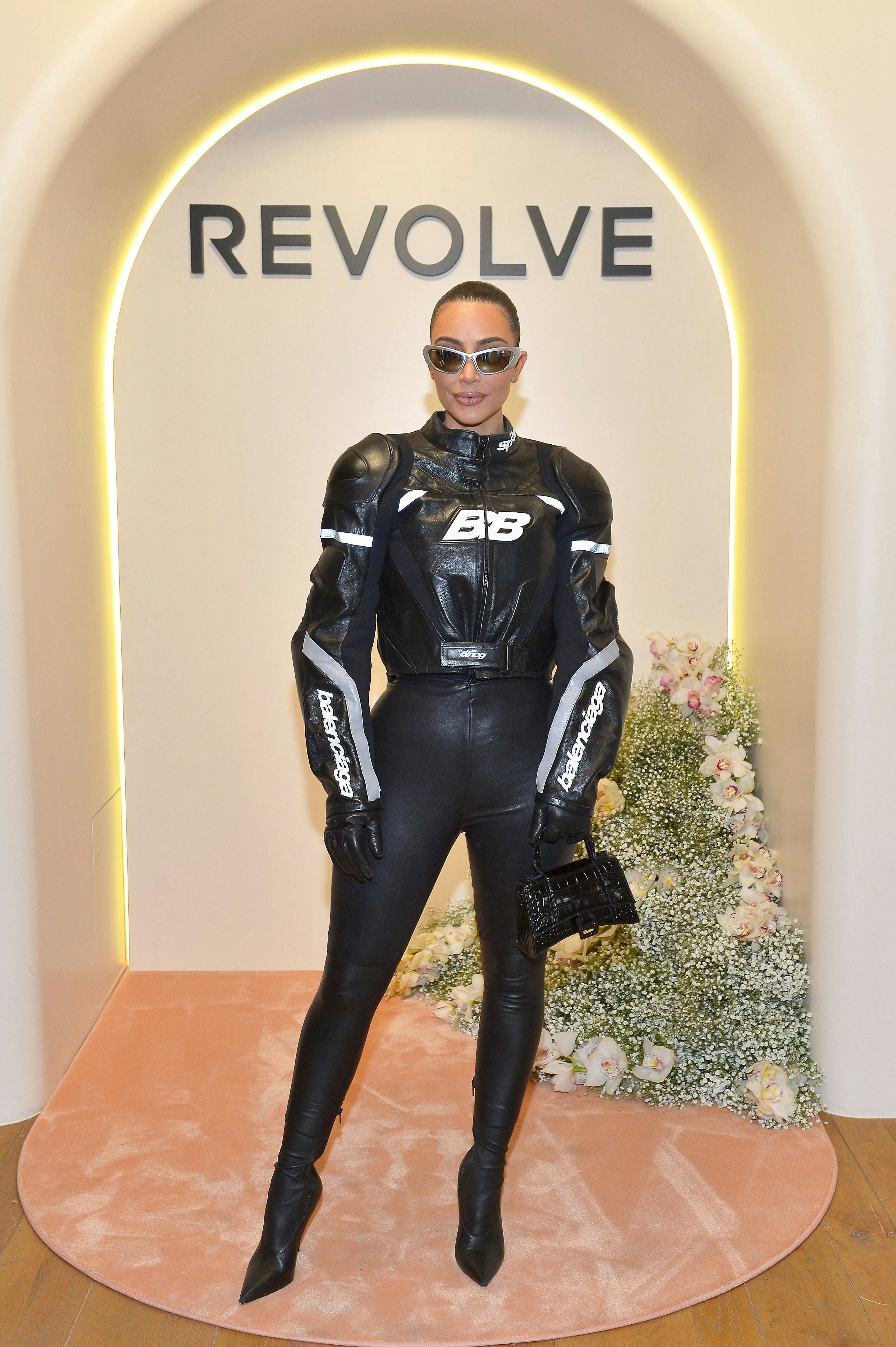 Kim Kardashian's Best Pantaboots Outfits, From Neon Pink To Velvet