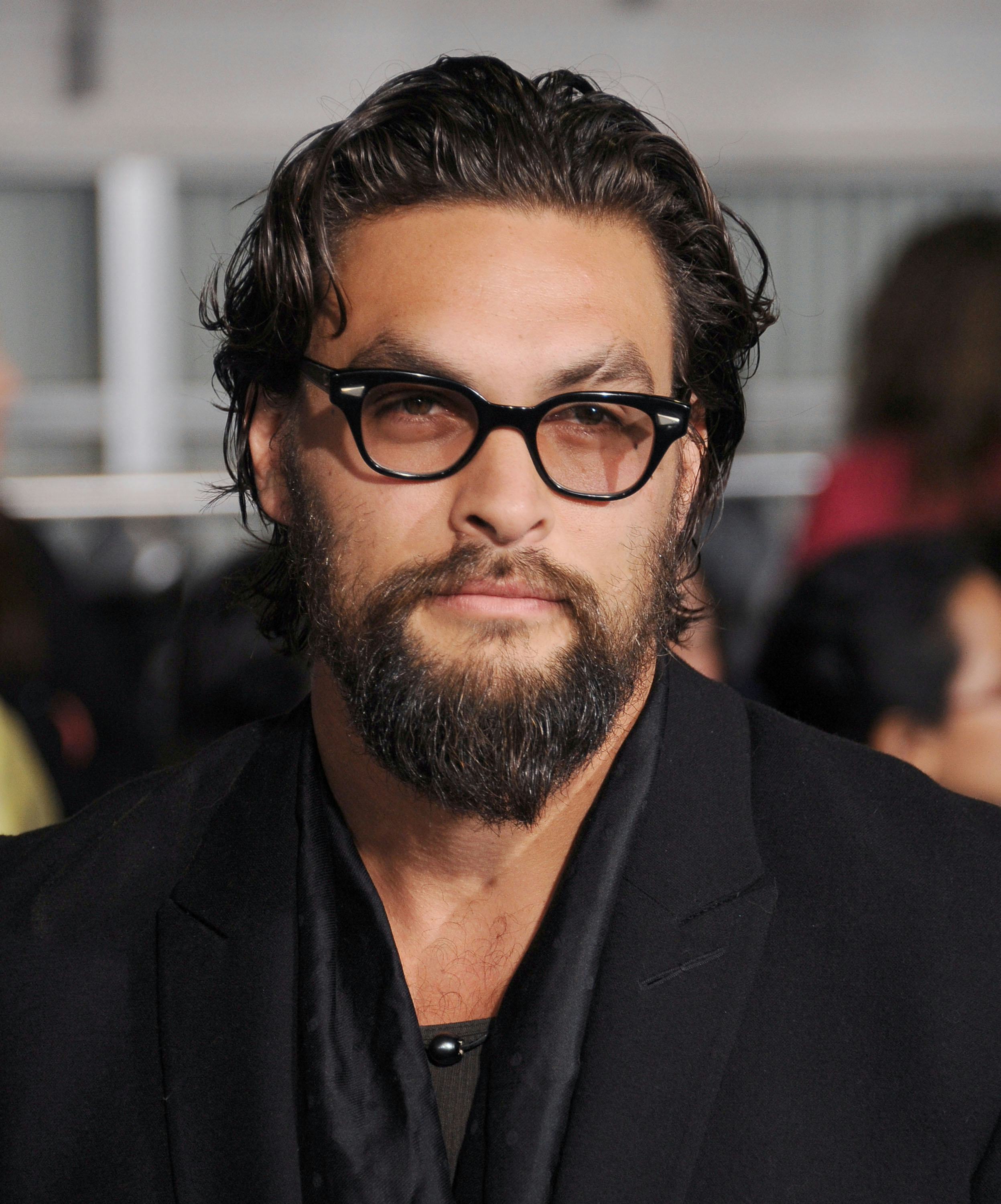 Jason Momoa's Hair Evolution Includes Short Hair, A Shaved Head, & Locs