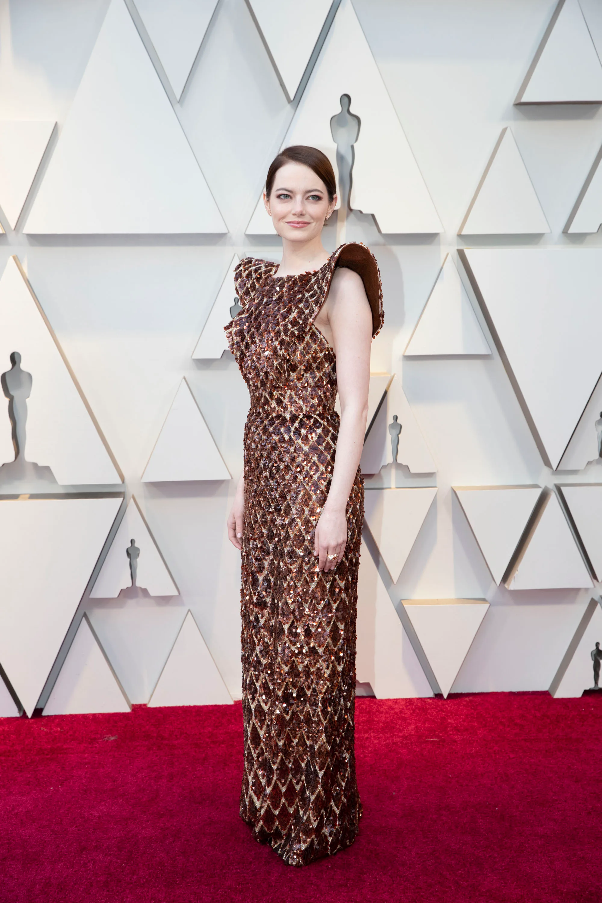 Emma Stone's Best Red Carpet Moments Show Her Love For Glamorous Details