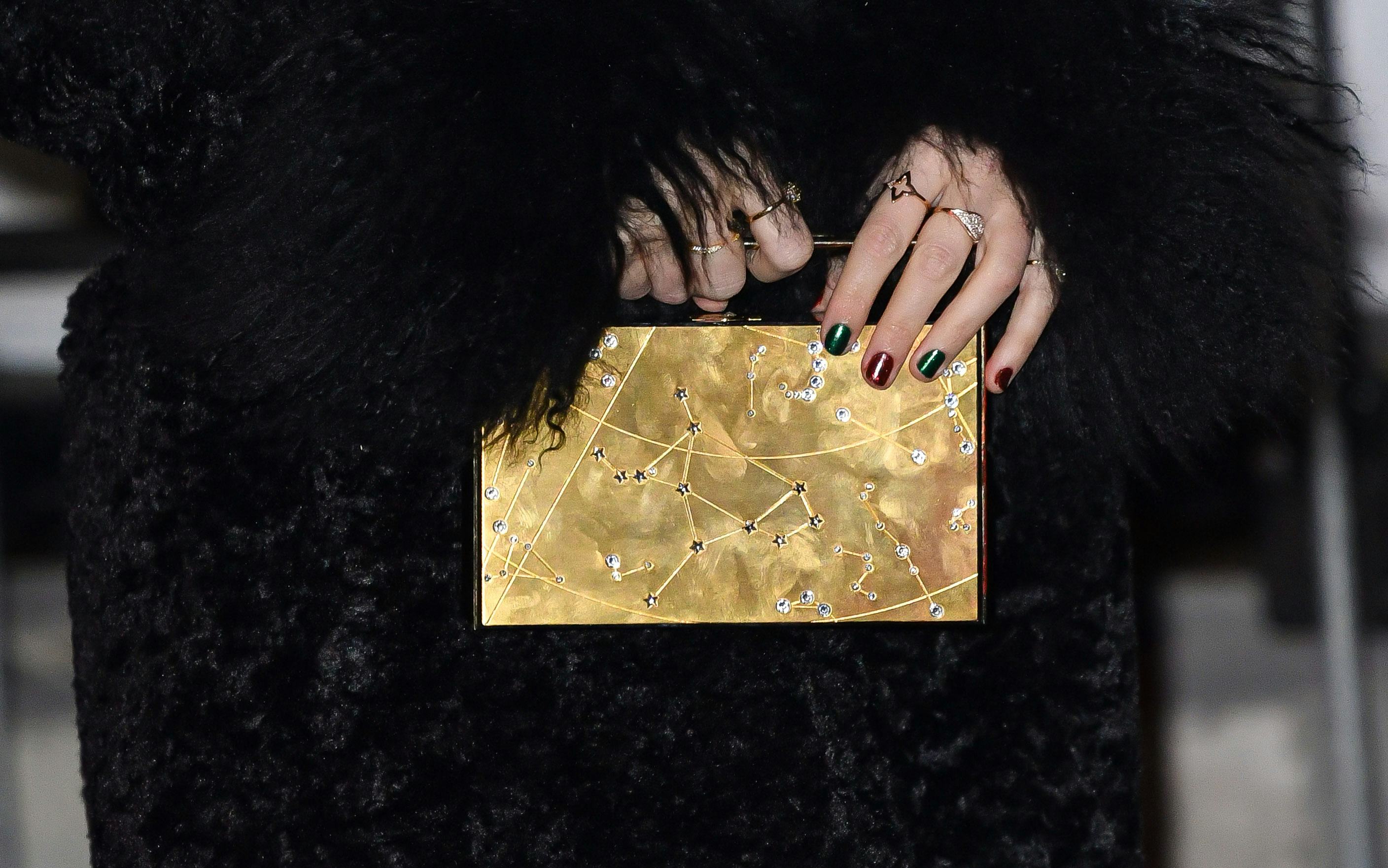 Taylor Swift's Chrome Christmas Nails Tap 2023's Hottest Mani Trend