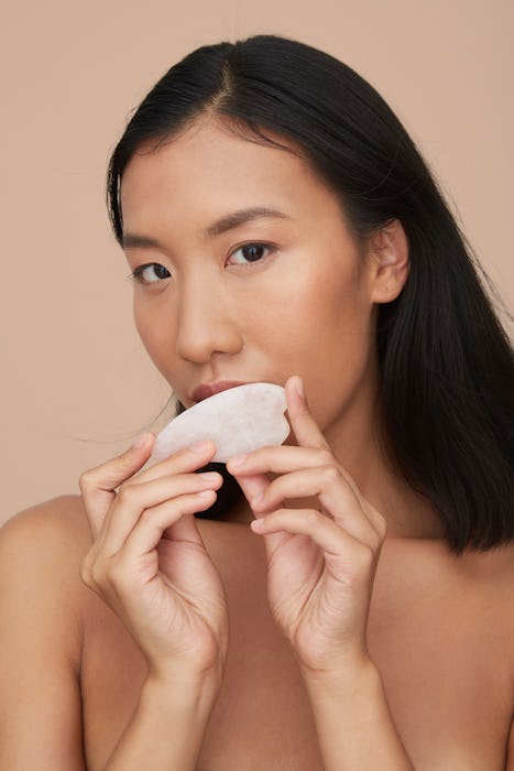 The History Of Gua Sha & How Its Actually Meant To Be Used