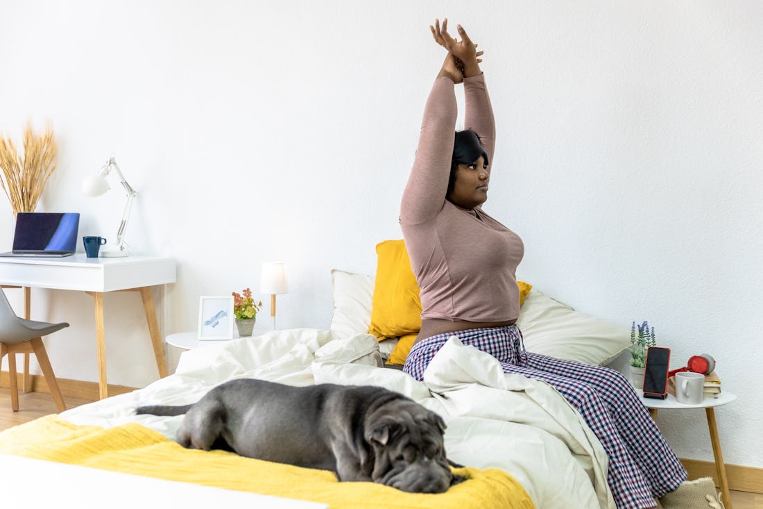 The 7 Best Back Stretches To Do Every Day, According To Trainers