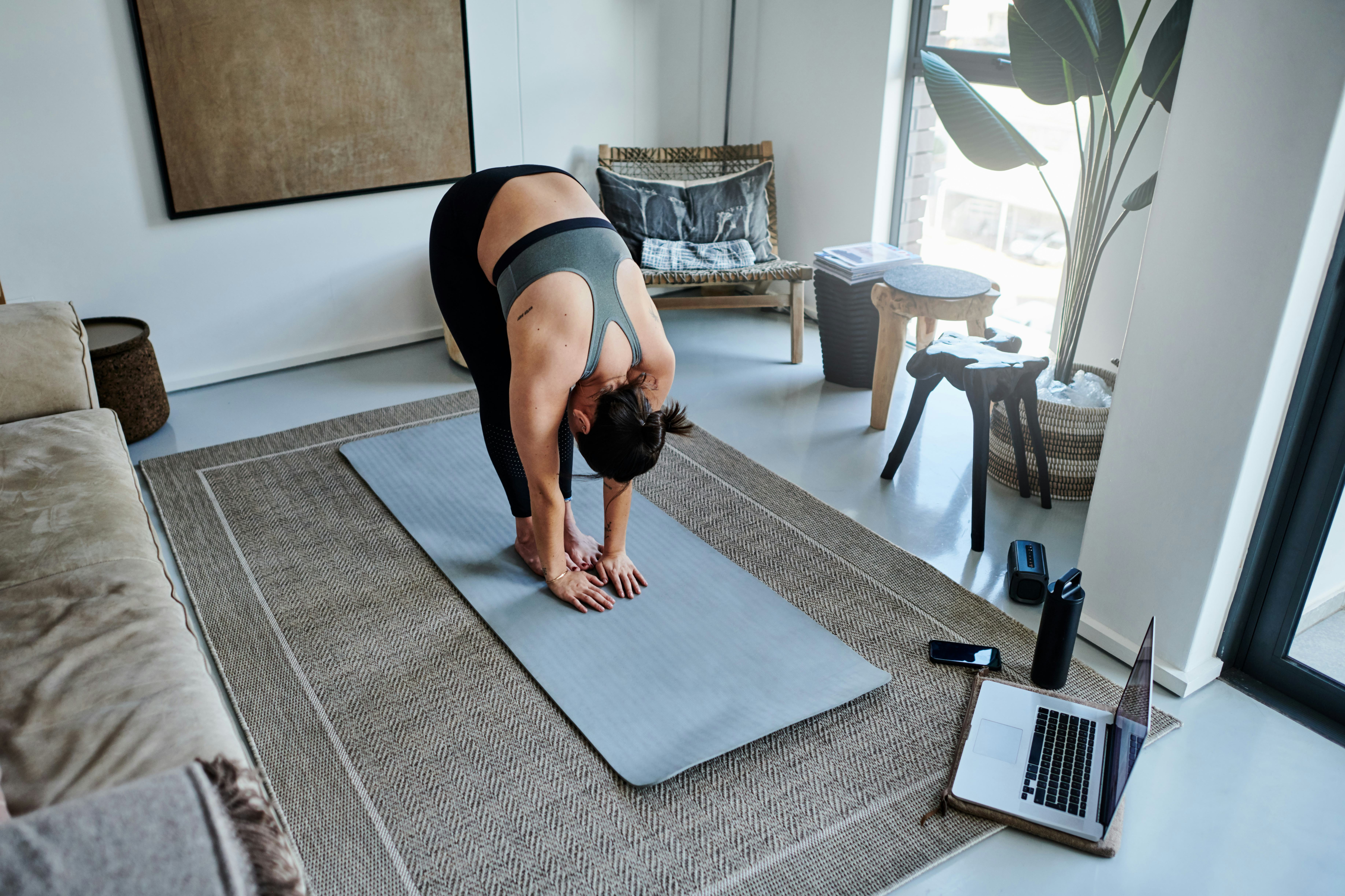 The Yoga Poses Everyone Does Wrong, According To Instructors