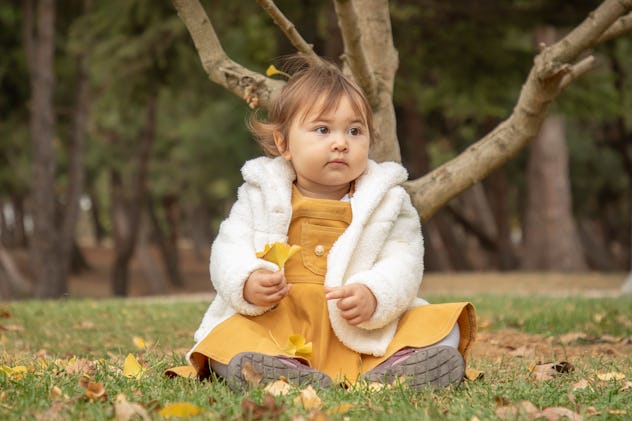 23 Fall Baby Names Inspired By Leaves, Poems, & Football
