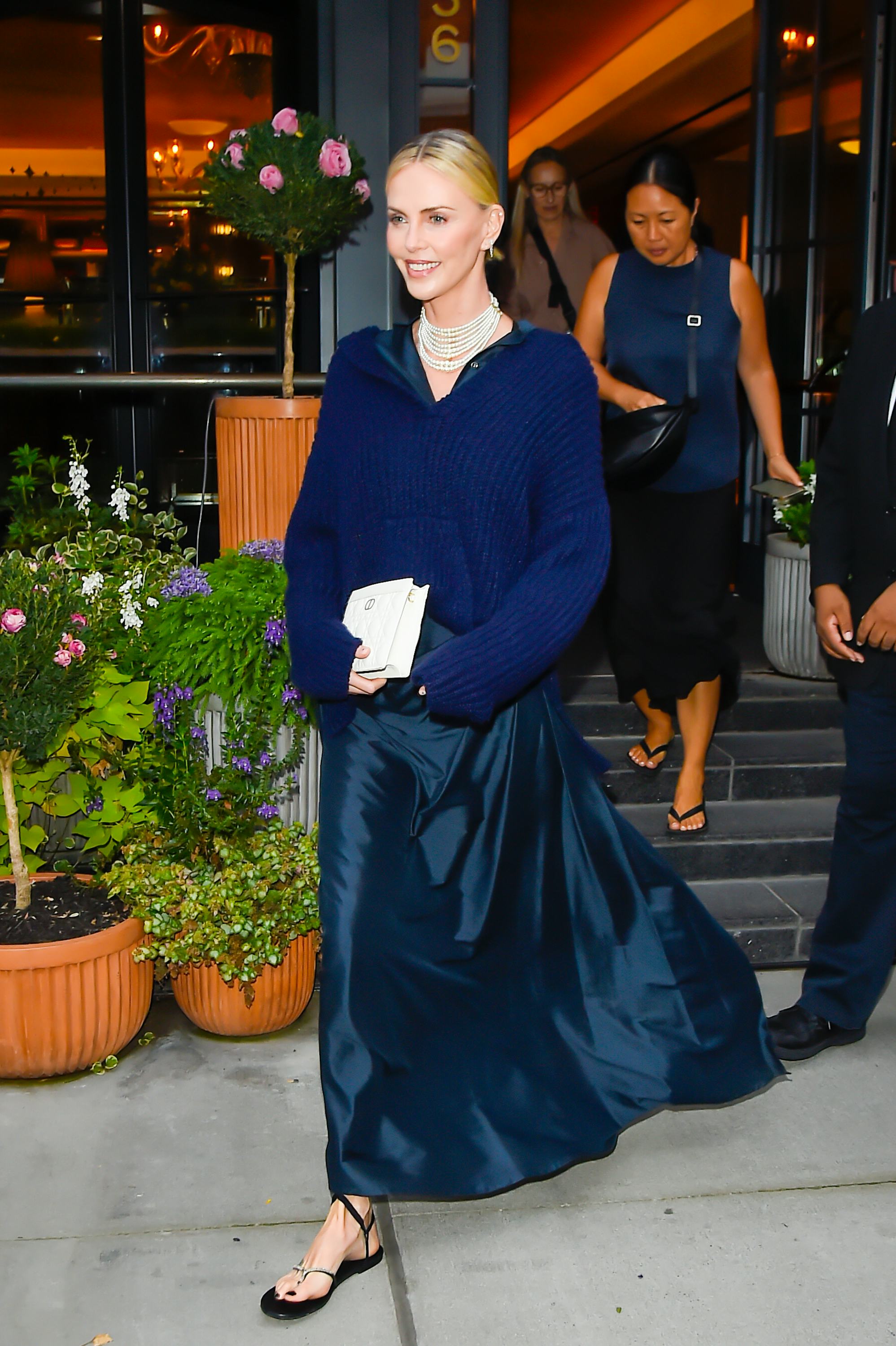 Charlize Theron Makes Flip Flops and a Sweater Work on the Red Carpet