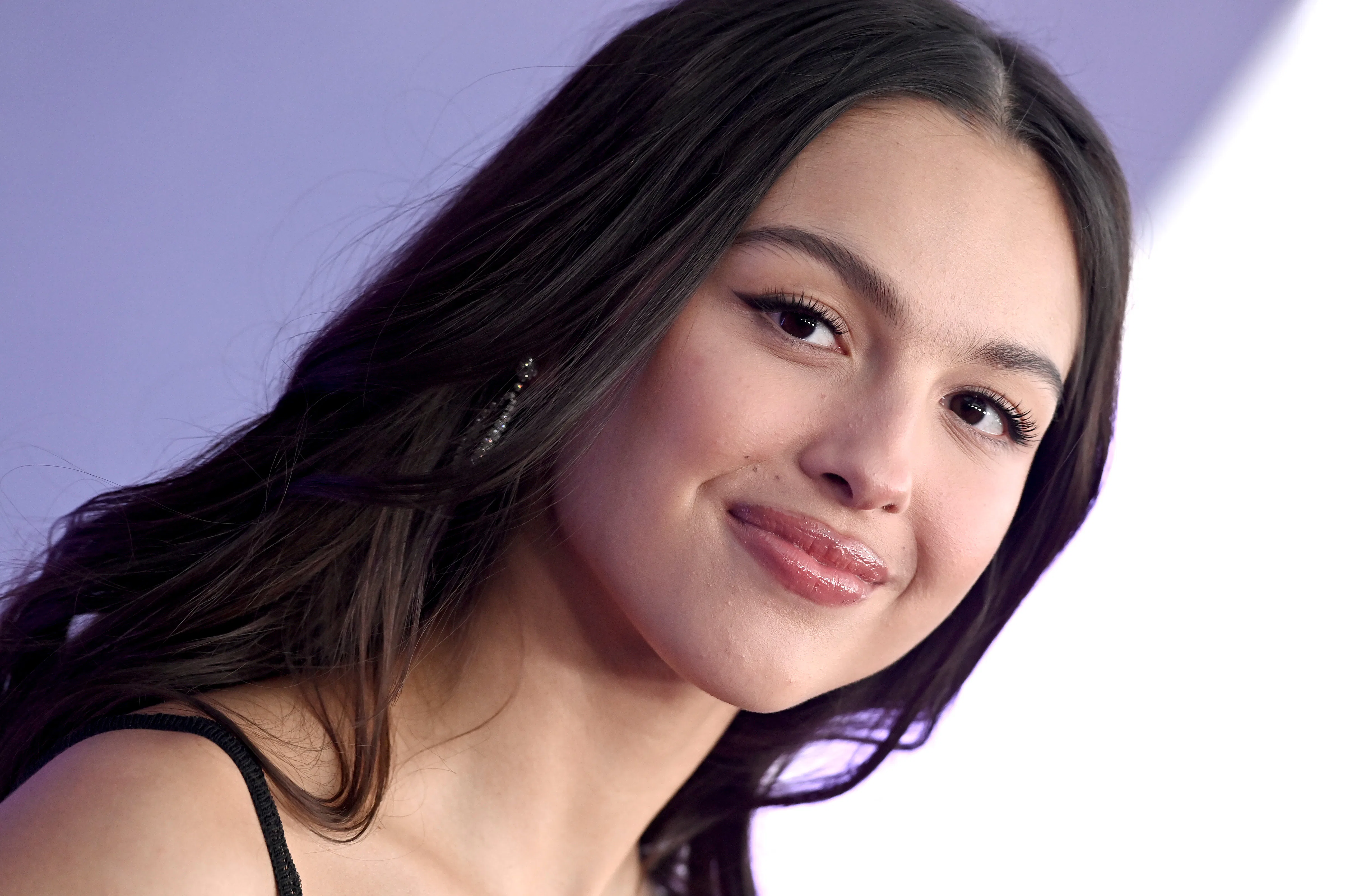 Olivia Rodrigo Wore A Plunging Polka Dot Dress On The NYC Subway