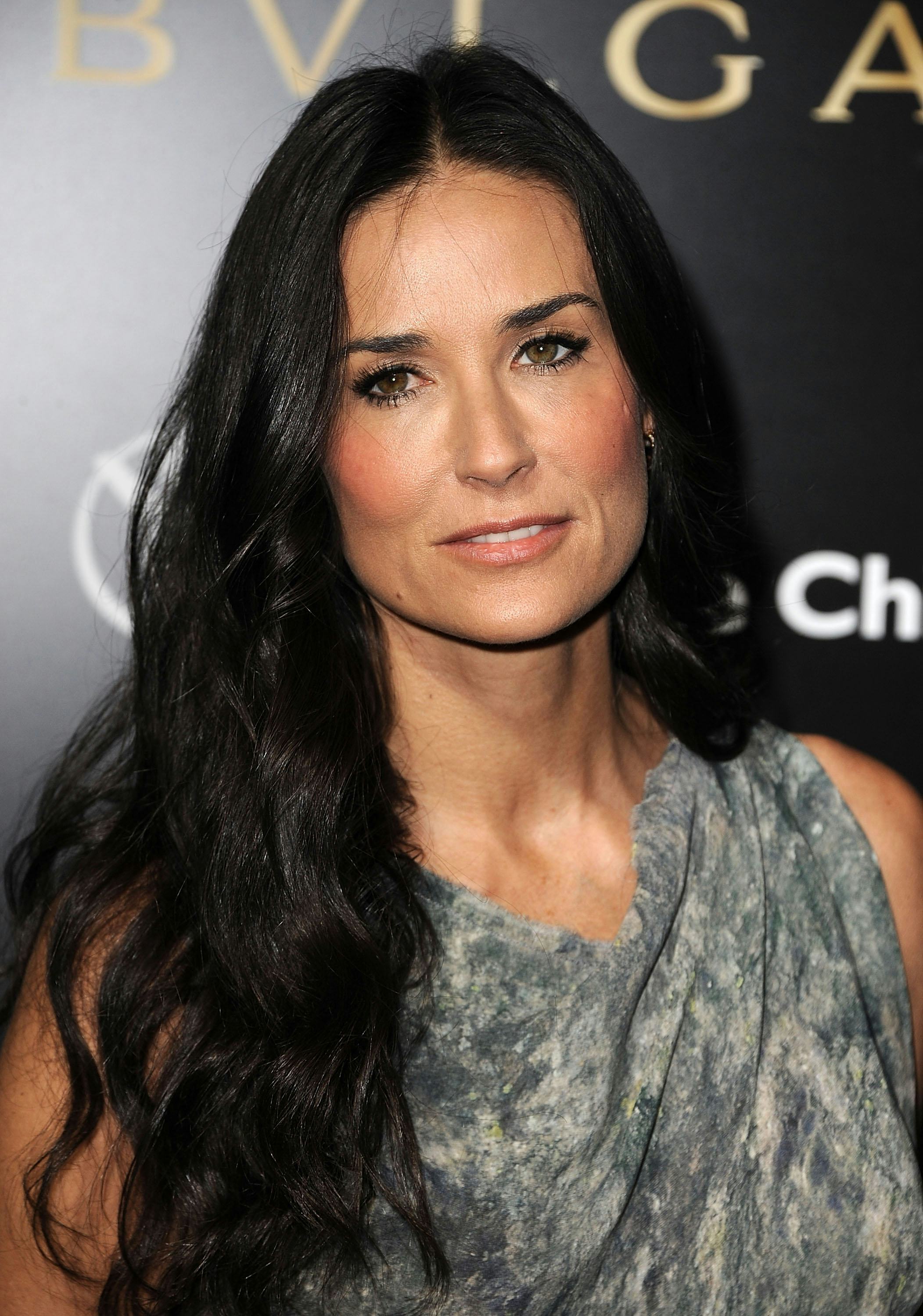 Demi Moore's Beauty Evolution Features 40 Years Of Nonstop Glamour