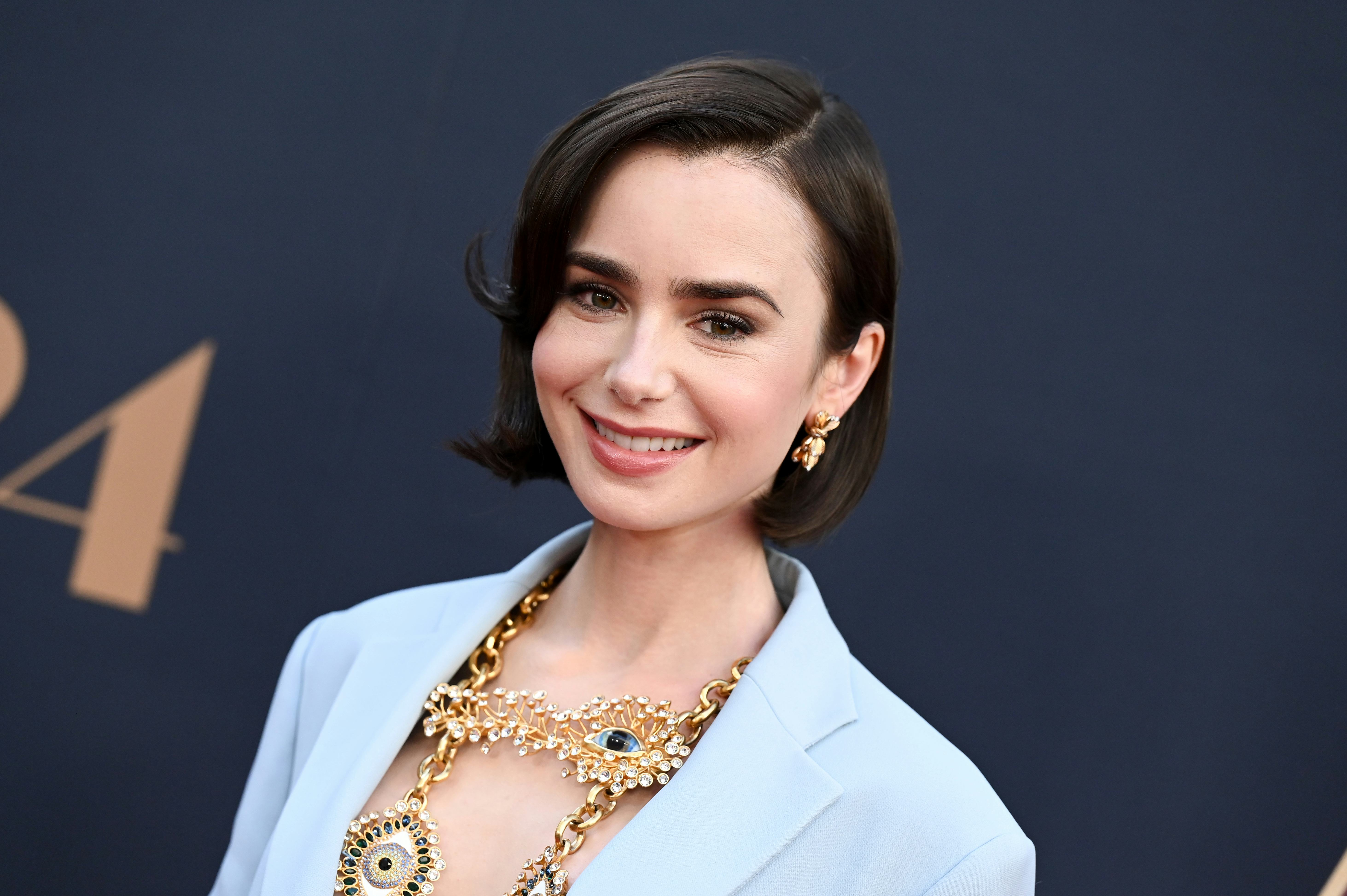 Lily Collins Wore A Gold Body Harness With Nothing Underneath