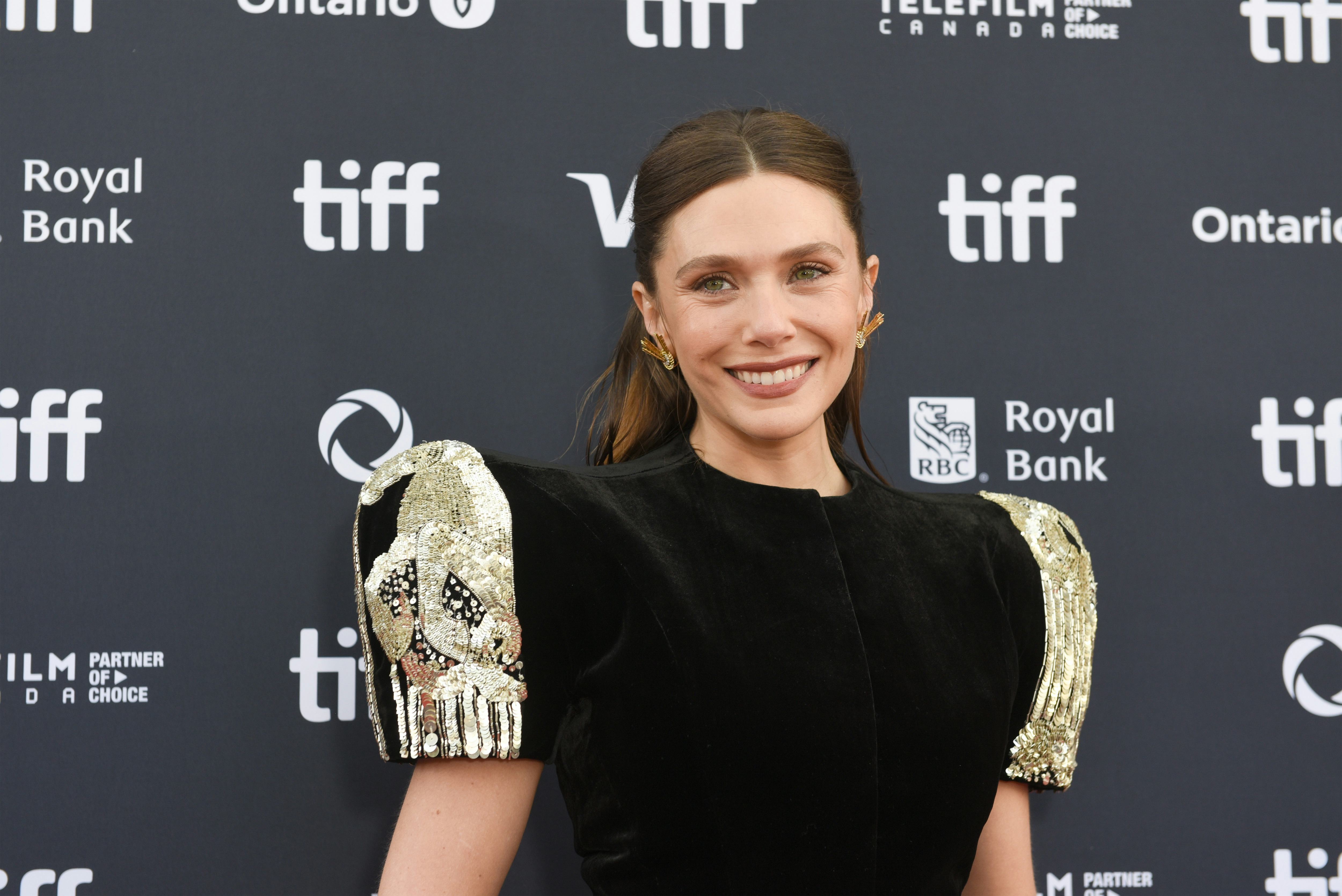 Elizabeth Olsen's Dewy Makeup Owes Everything To This Luxe Cream