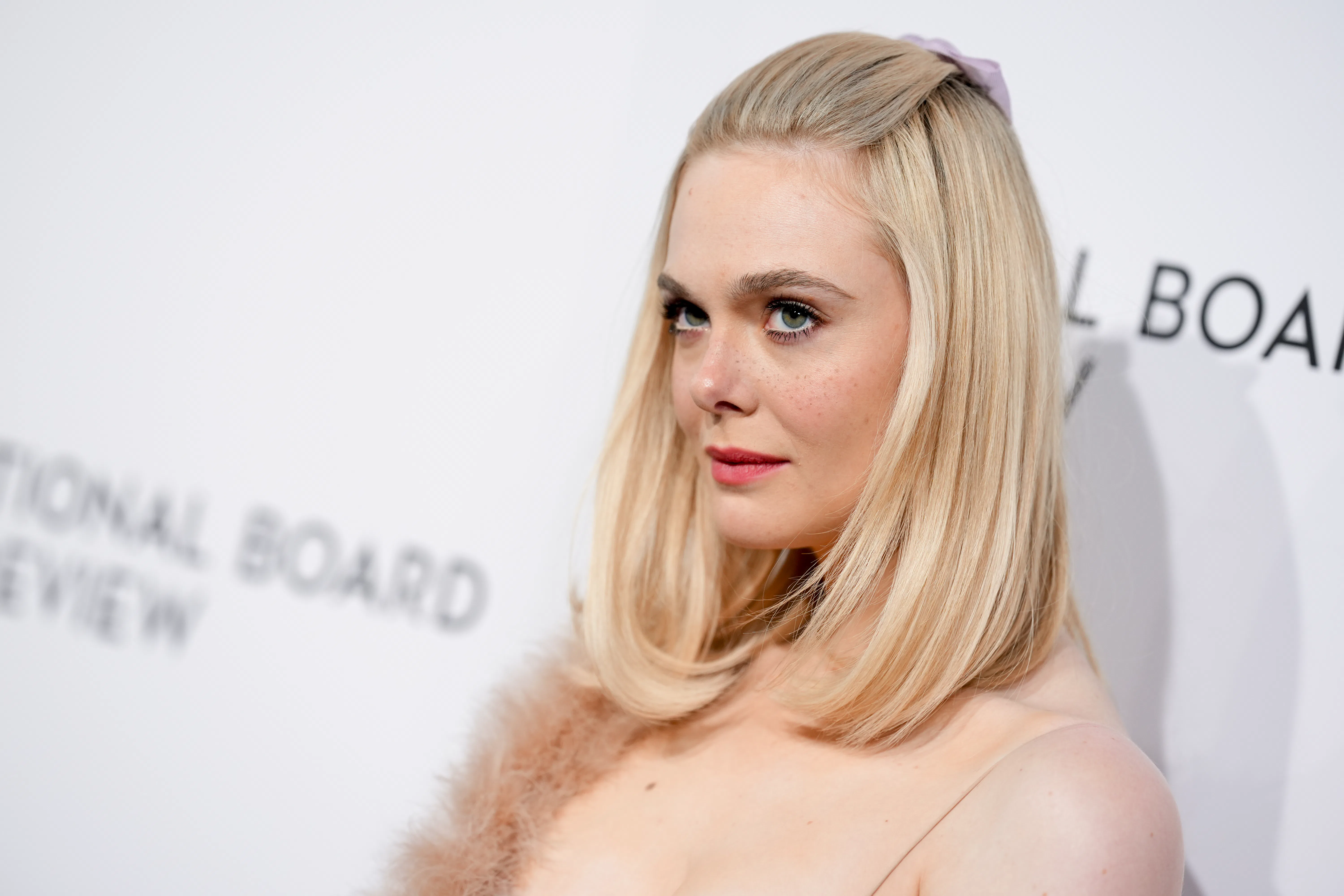 Elle Fanning's Hair Bow Created A 'Bridgerton'-Inspired Beauty Moment