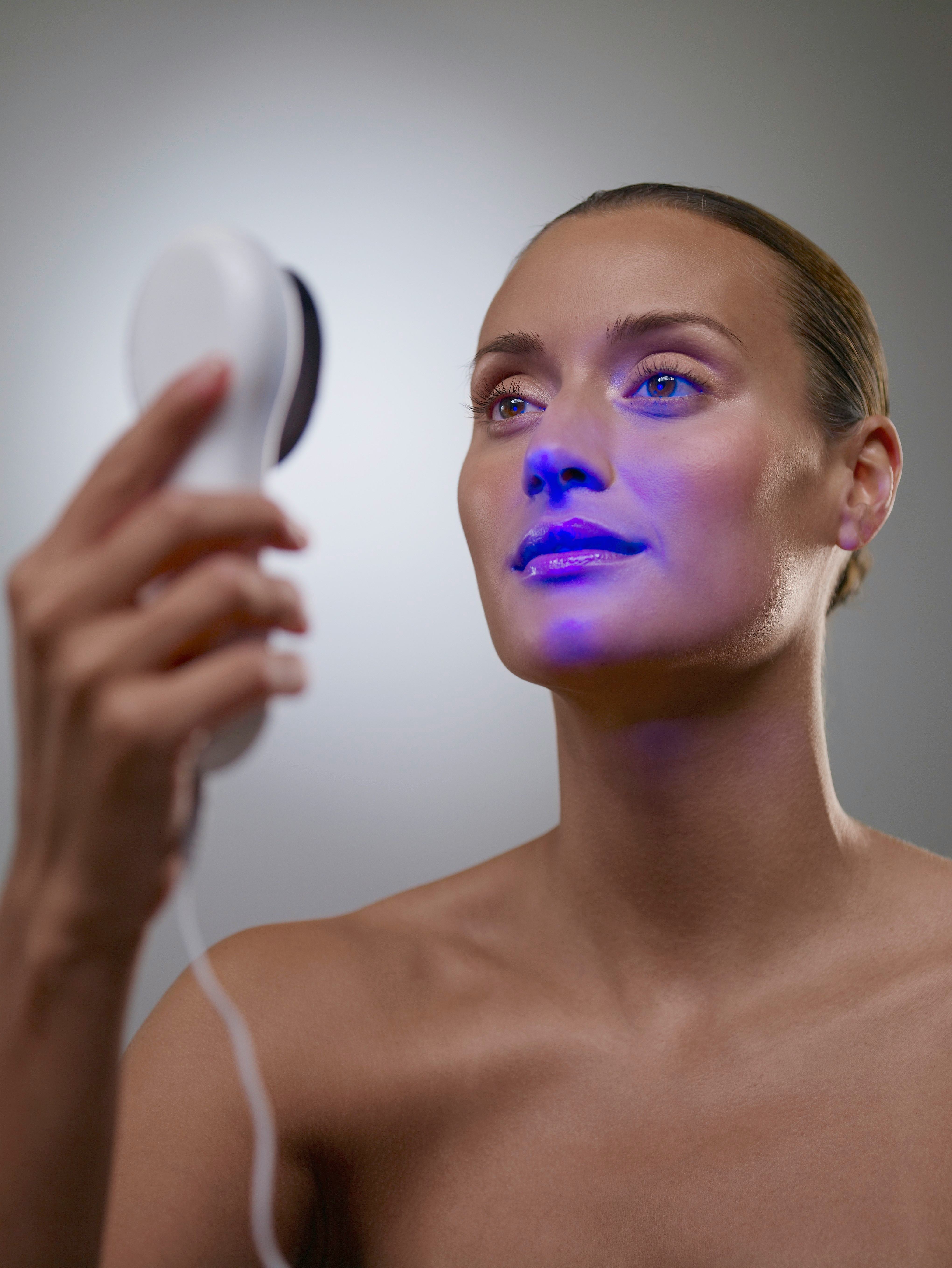 Does Blue Light Therapy For Your Skin Work? Experts Explain The Benefits