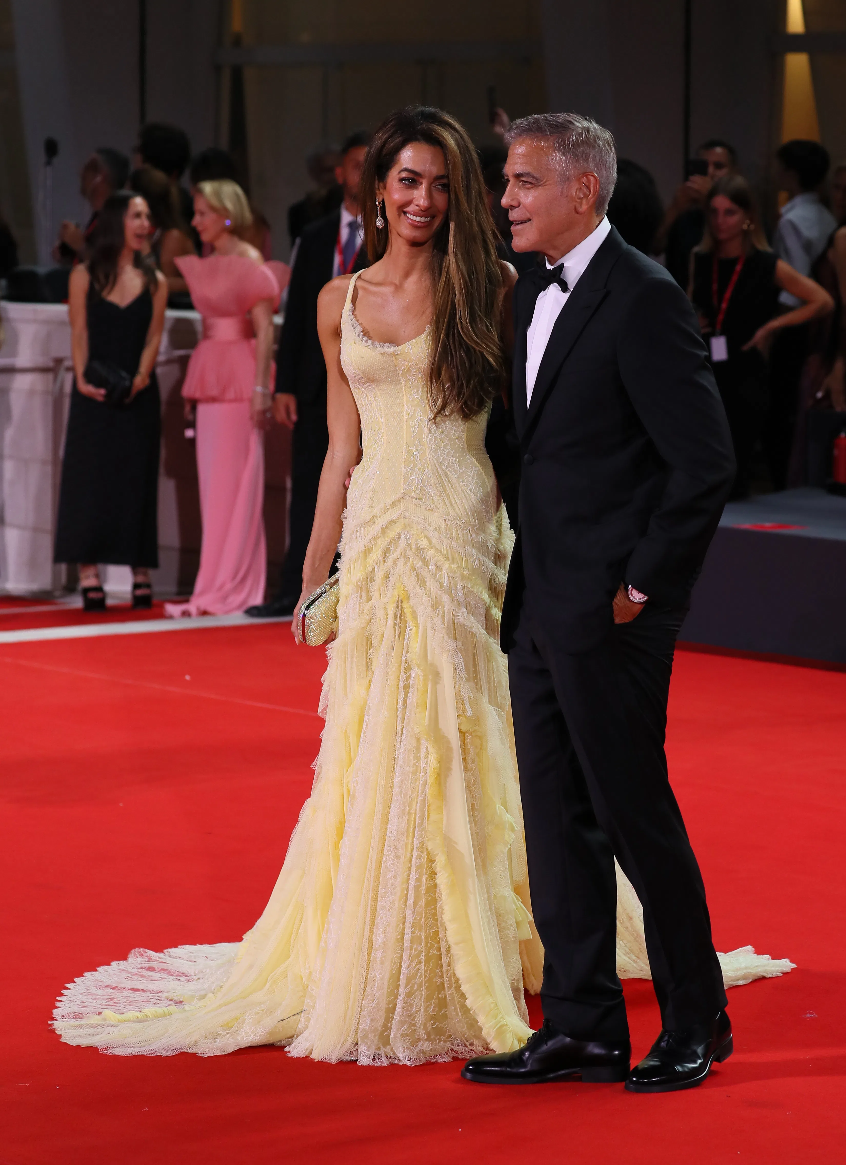 Amal Clooney Returns to the Venice Film Festival in Her Go-to Summer Color