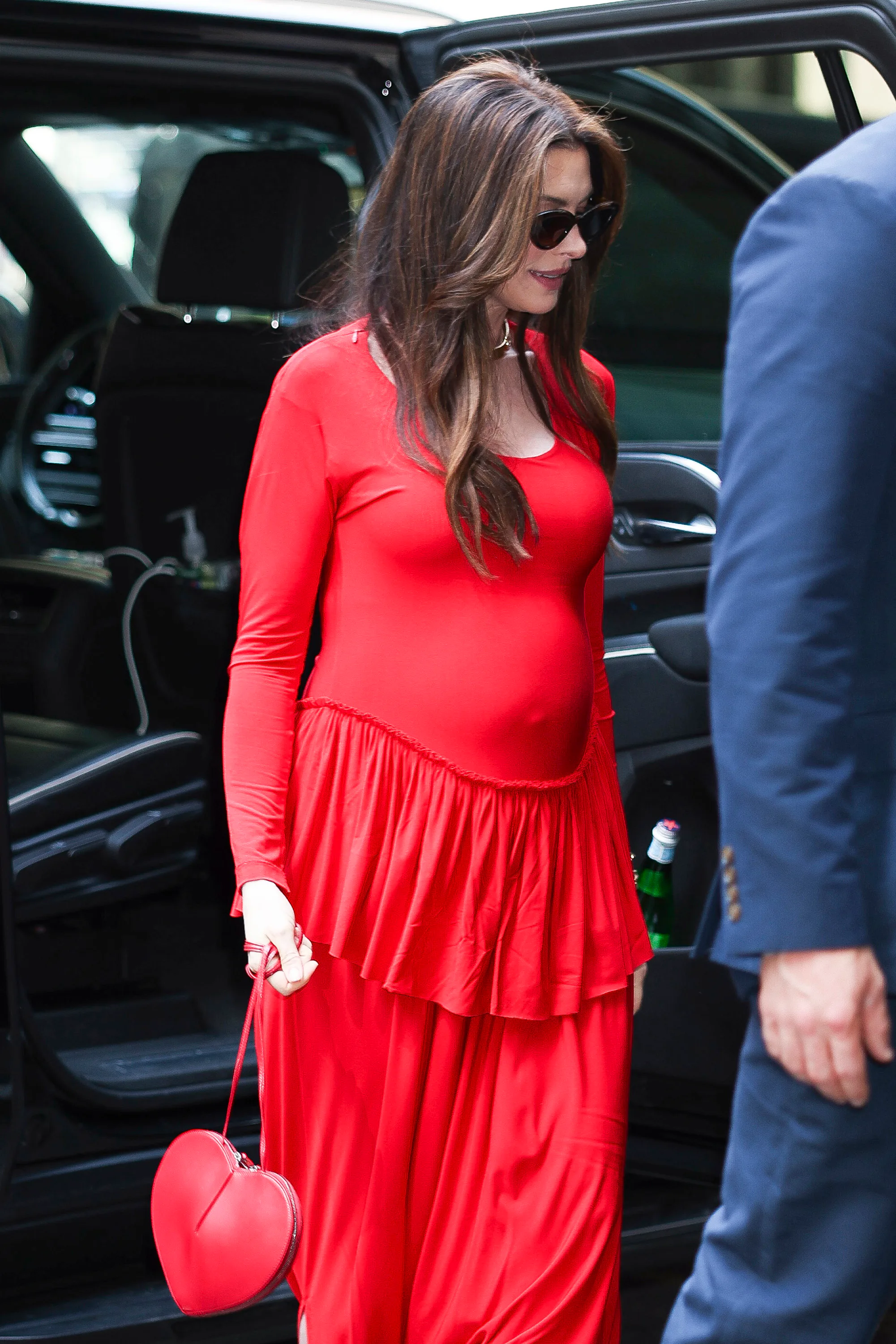Anne Hathaway's Pregnancy Style Includes A Monochromatic Red Look