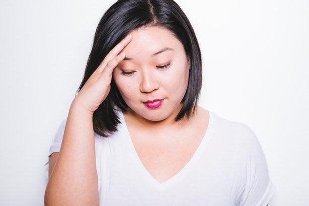 7 Reasons Why You’re So Indecisive, According To Experts