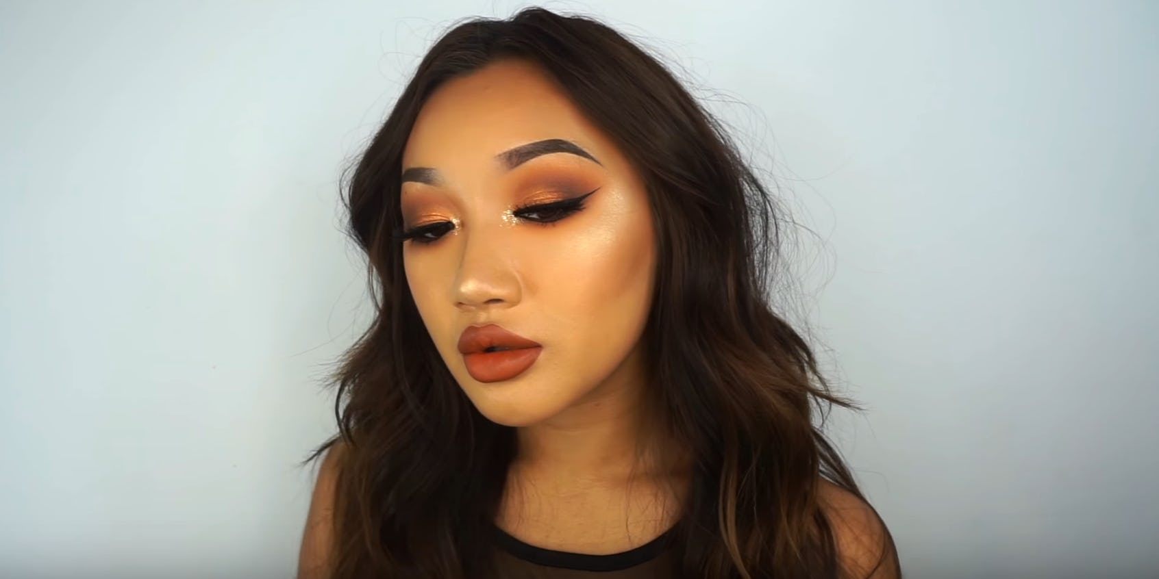 How To Do An Orange Smoky Eye For A Sultry Copper Vibe