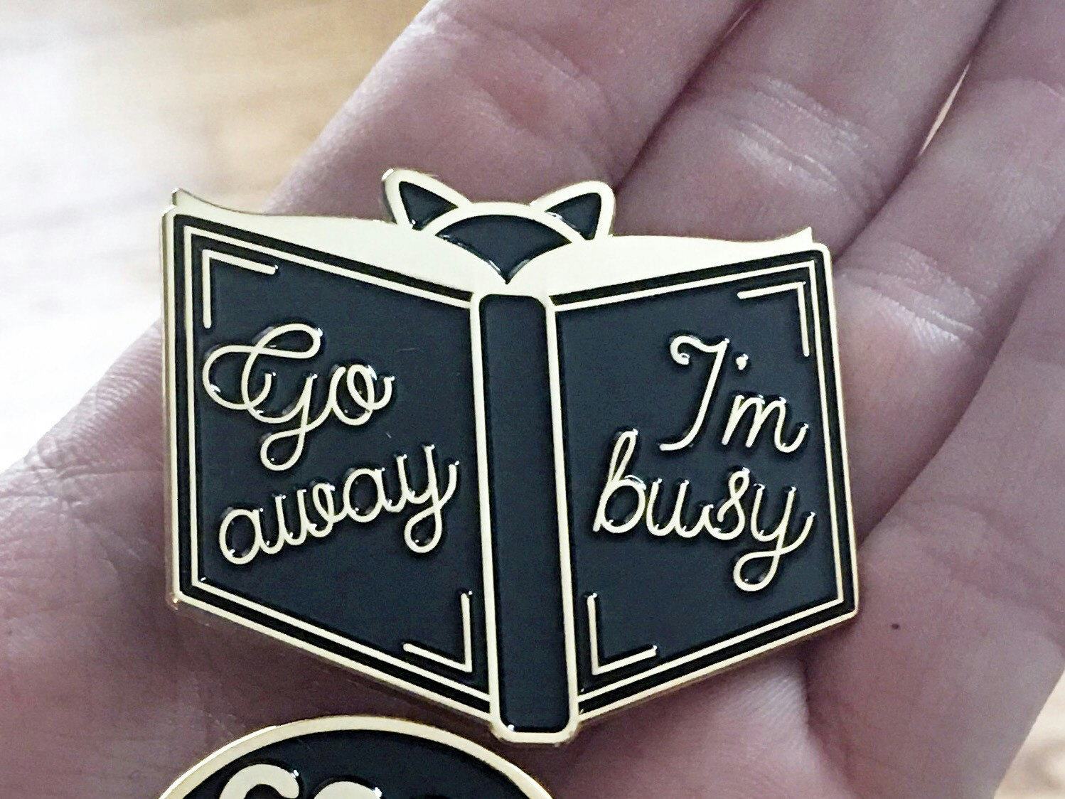 25 Literary Enamel Pins To Add Some Bookish Swag To Your Beach Bag