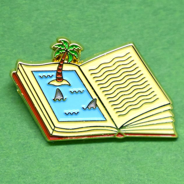 25 Literary Enamel Pins To Add Some Bookish Swag To Your Beach Bag