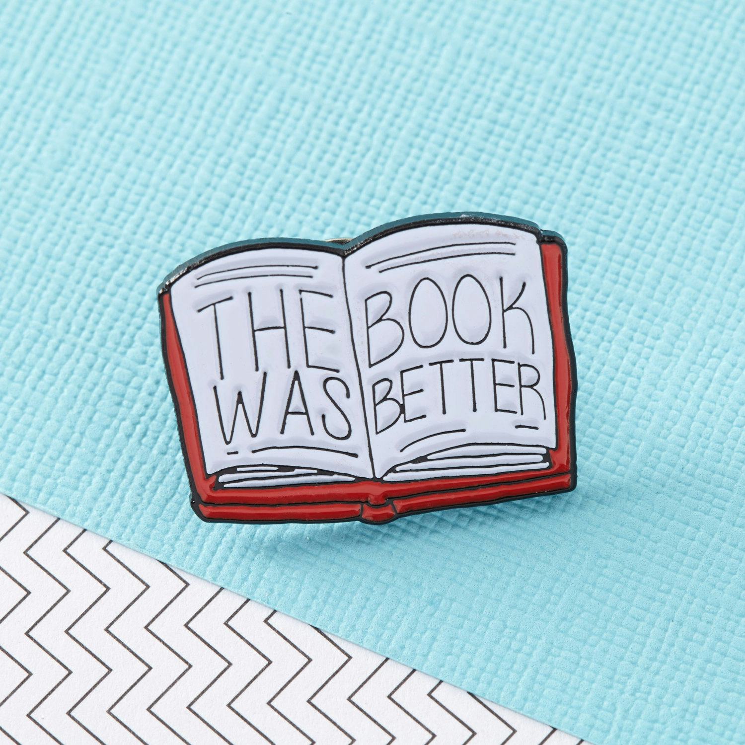 25 Literary Enamel Pins To Add Some Bookish Swag To Your Beach Bag