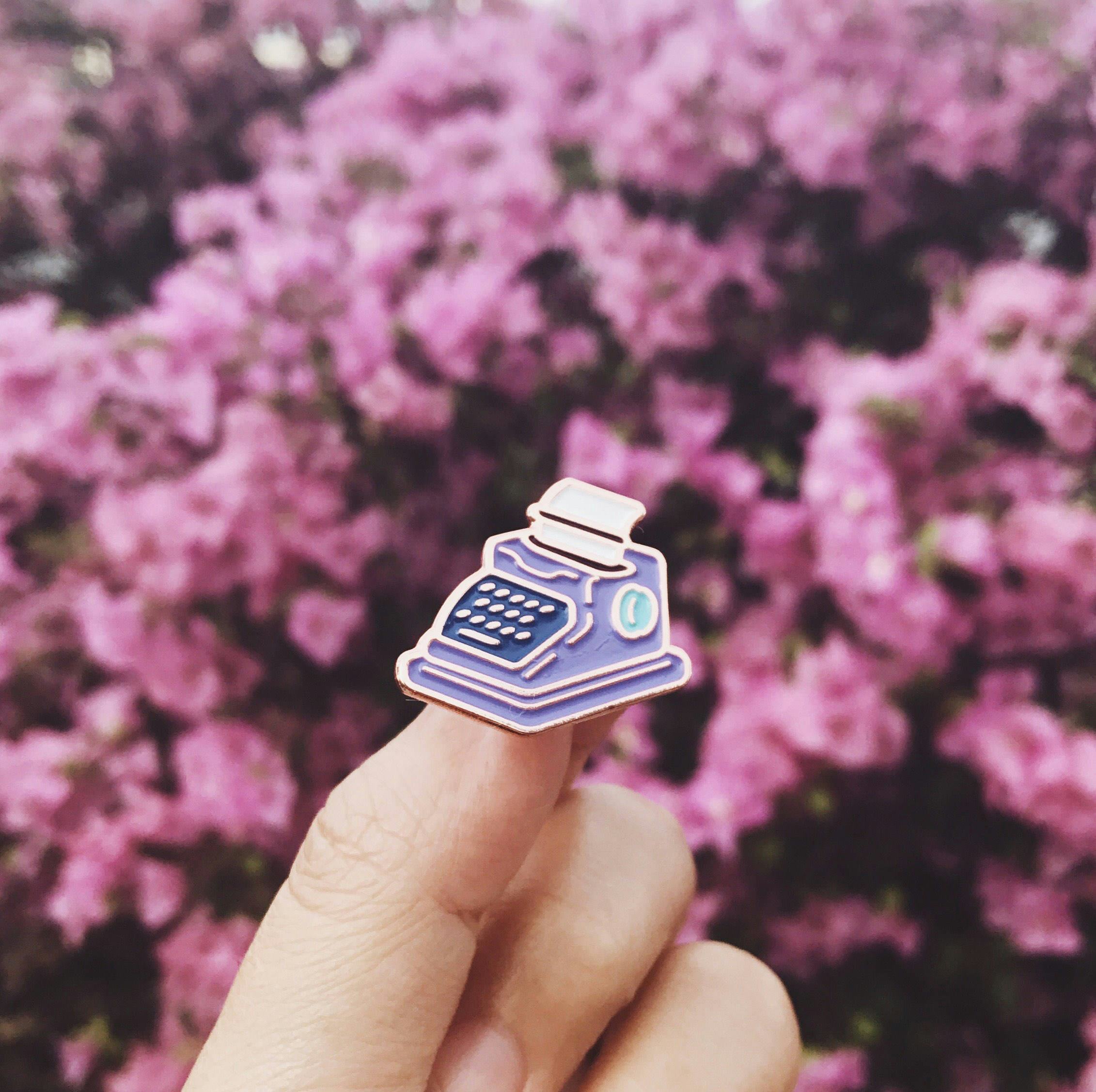 25 Literary Enamel Pins To Add Some Bookish Swag To Your Beach Bag