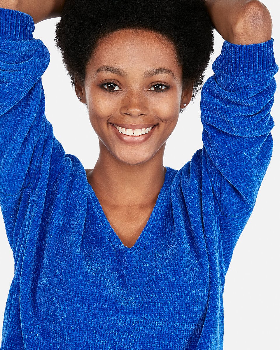 How To Layer Sweaters, As Shown In Three Easy Outfits