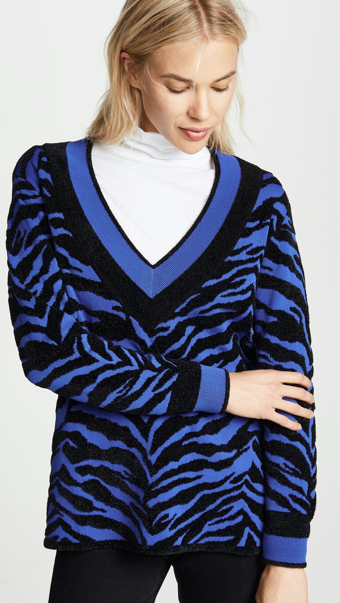 How To Layer Sweaters, As Shown In Three Easy Outfits