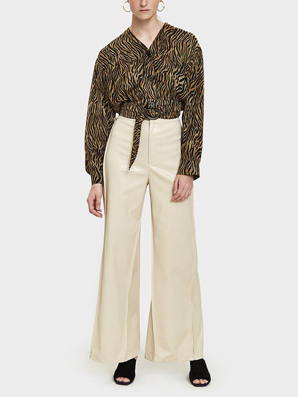 Chrissy Teigen’s Tiger-Print Skirt Proves Leopard Shouldn’t Be The Only ...