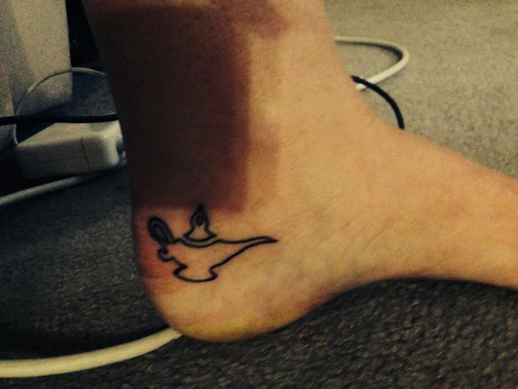 Magic Lamp Tattoo The Subtle Disney Tattoos To Get, Based On Your