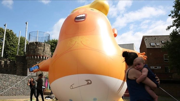 Photos Of The Trump Baby Blimp In London Have Taken Over Twitter