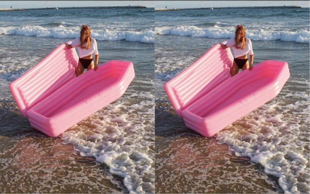 A Millennial Pink Coffin Float Exists, So Now You Can Ponder Your Mortality In Style