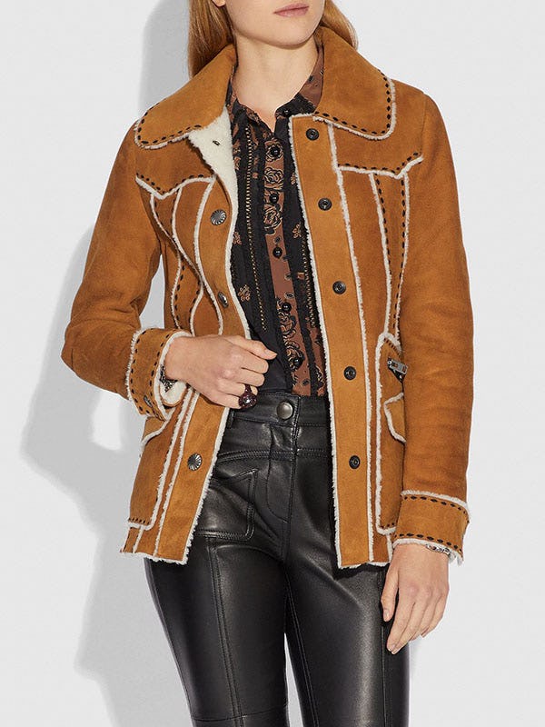 Emma Roberts’ Airport Style Is All About Statement Outerwear