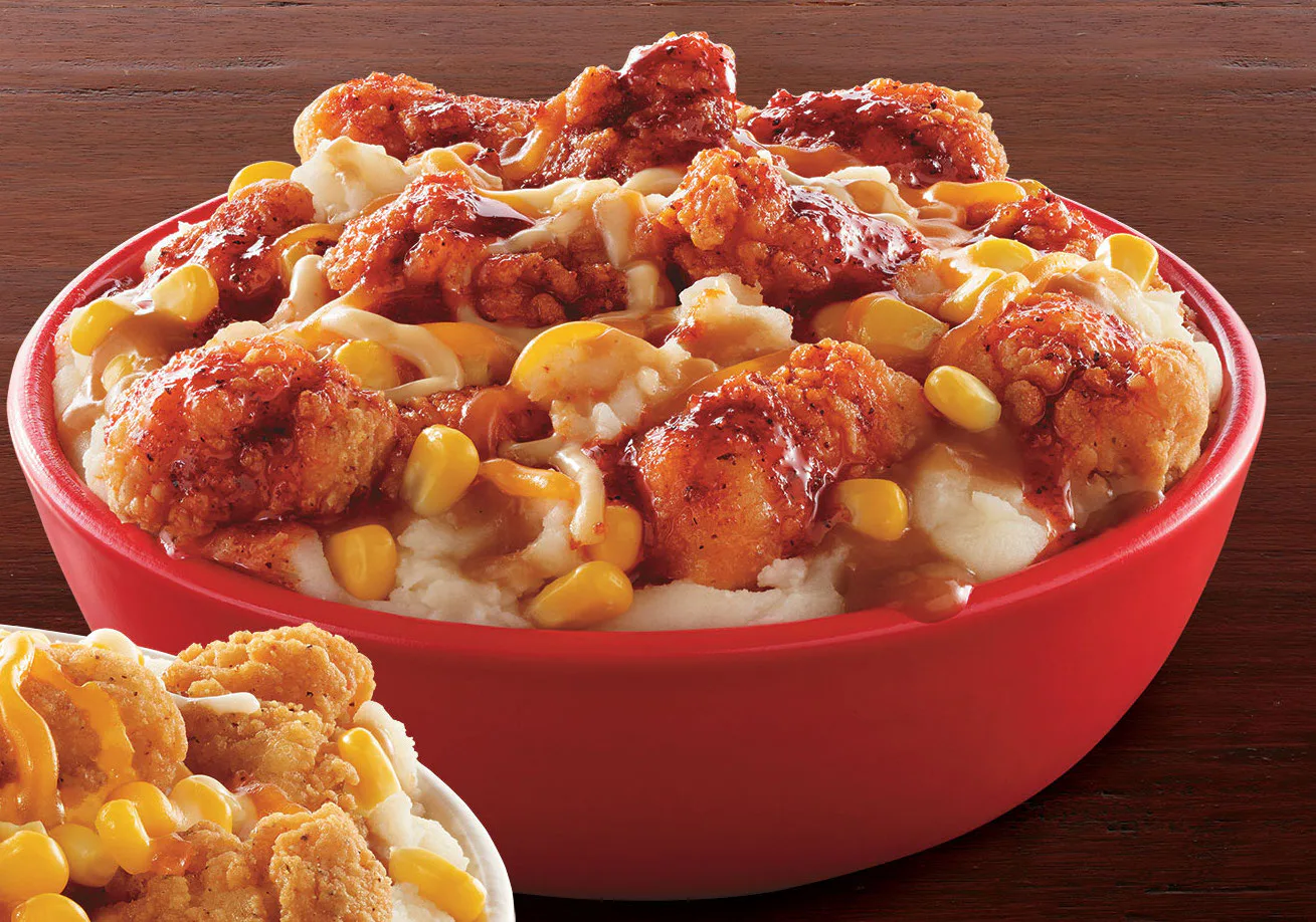 KFC's $3 Famous Bowl Promo Includes This New Spicy Version With A Kick