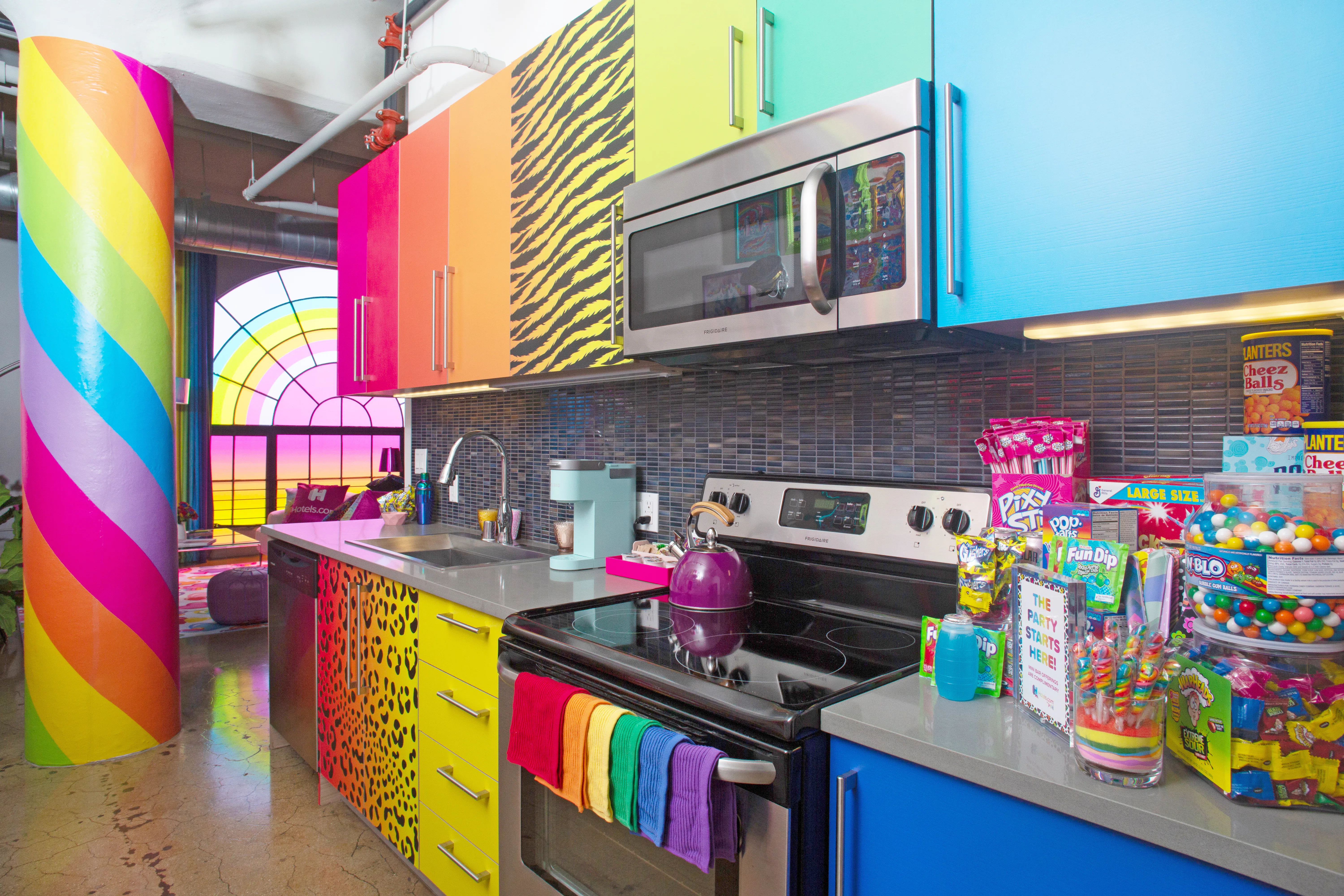 This Lisa Frank-Themed Hotel Room Is A Rainbow Dream