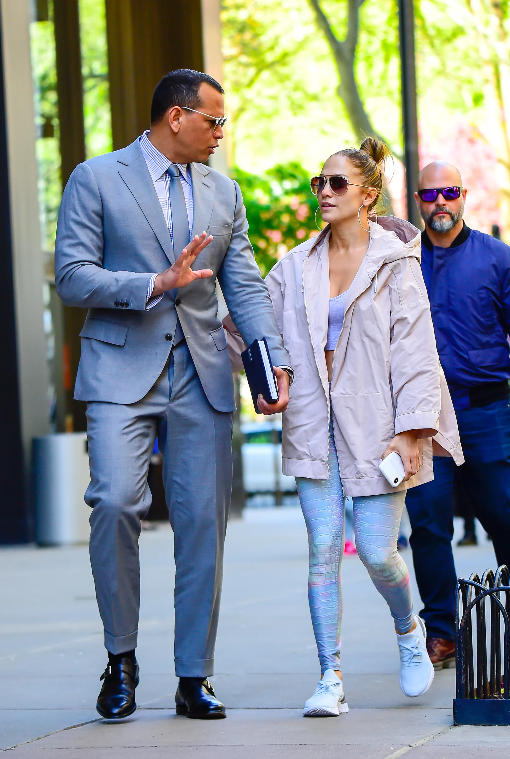 Jennifer Lopez’s Pink Raincoat Is A Spring Essential — Here’s How She ...