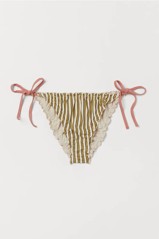 The Love Stories x H&M Collab Is Proof You Need A Belted Swimsuit This ...