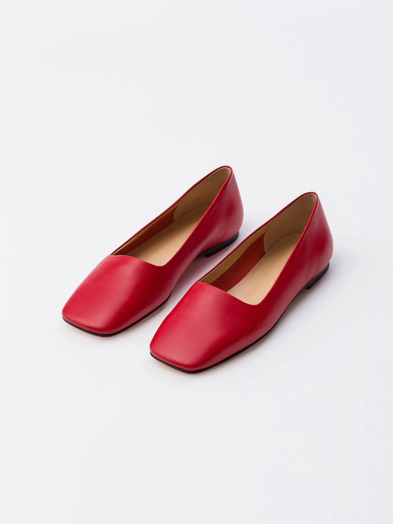 7 Minimalist Shoe Brands Making Simple (& Chic) Footwear For Every Season