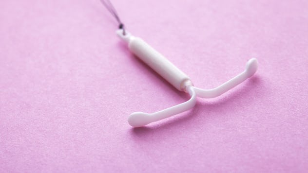 6 Signs You're Pregnant With An IUD, According To Experts